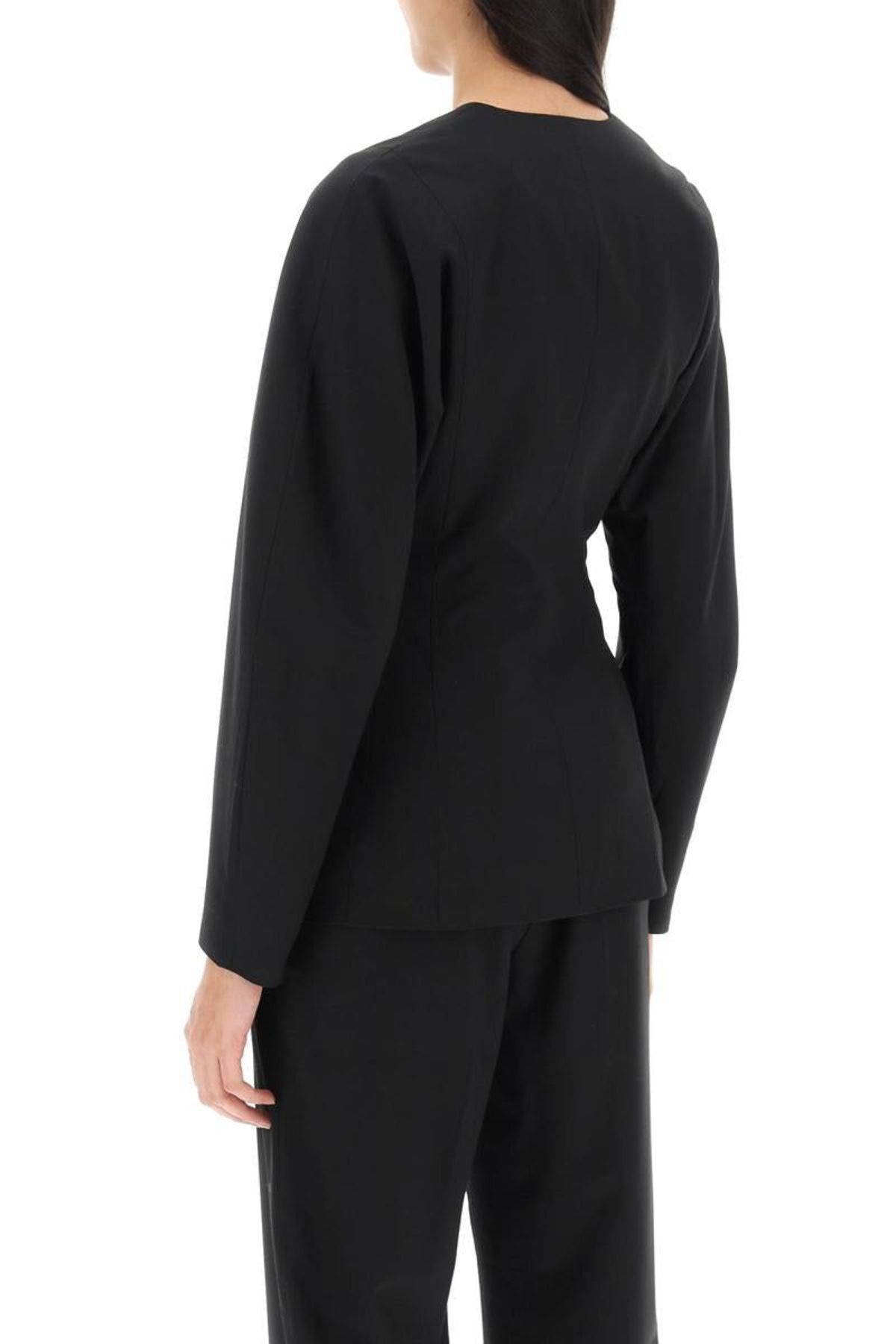Ganni shaped jacket with curved sleeves | Garmentory