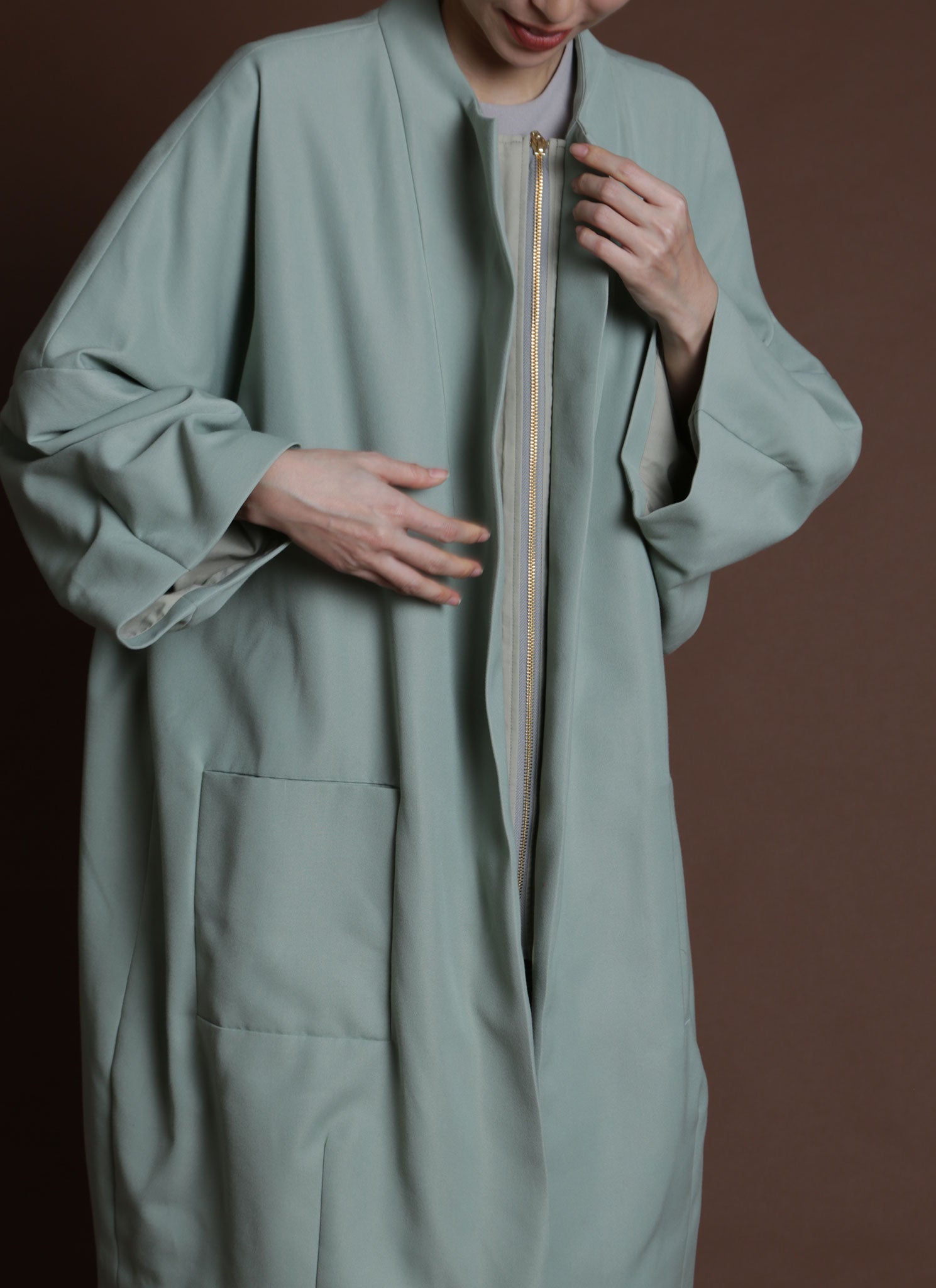 KAAREM Arum Dropped Sleeve Long Zipper Coat - Sage Green | Garmentory
