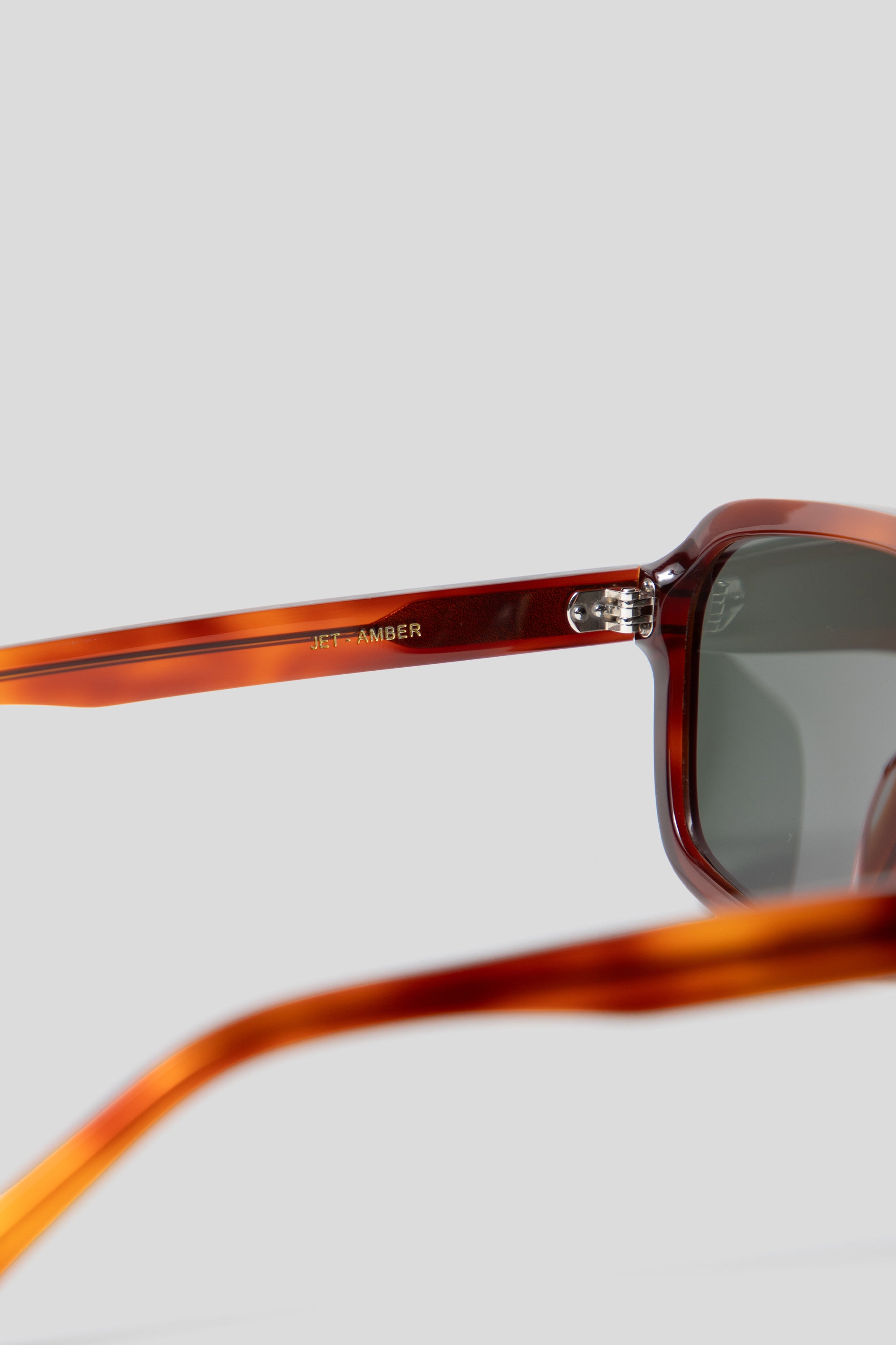 Monokel Jet Eyewear - Amber/Green Solid Lens | Garmentory