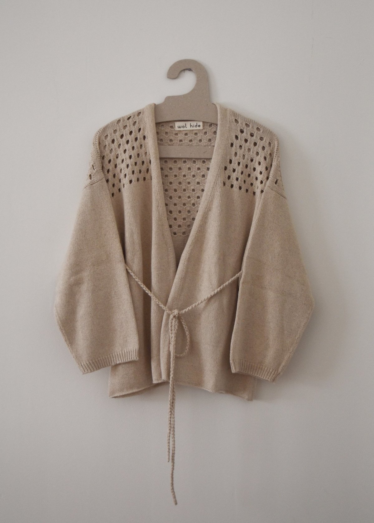 Wol Hide Pointelle Wrap top - natural | Garmentory