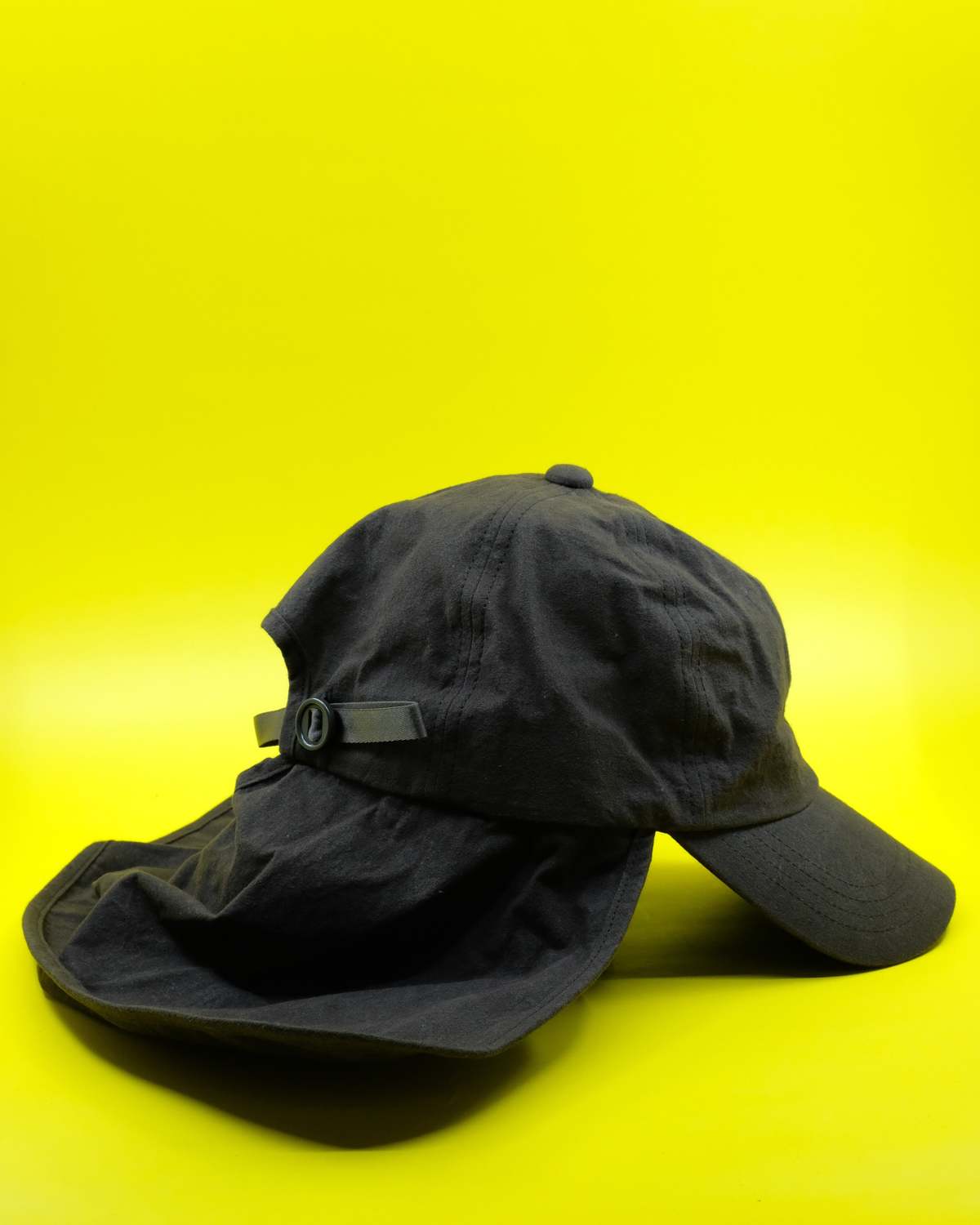 MAN-TLE Sun-Flap Cap - Earth Wax | Garmentory
