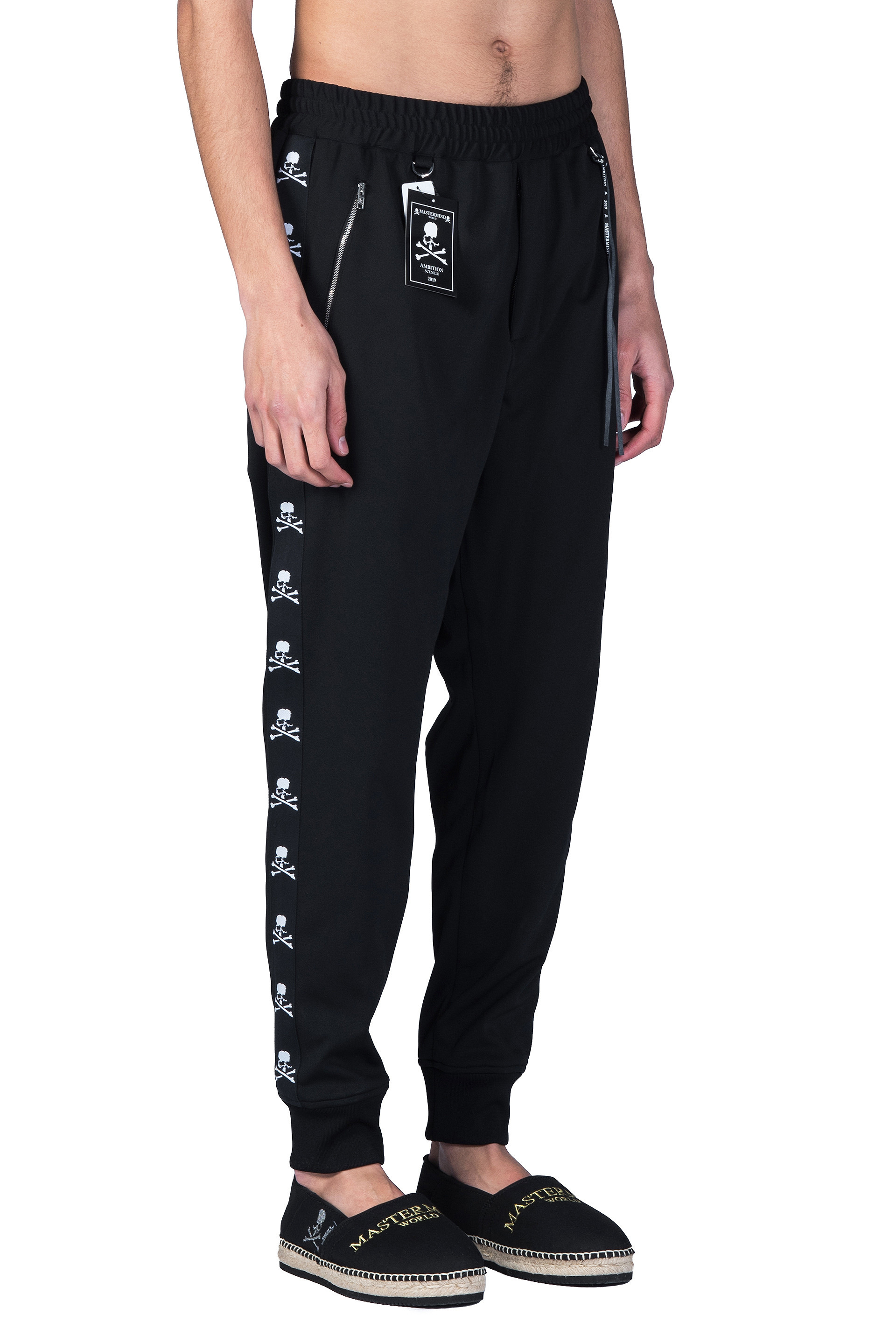 Mastermind World skull tape track pants - black | Garmentory