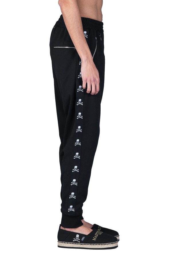 Mastermind World skull tape track pants - black | Garmentory