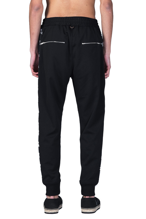 Mastermind World skull tape track pants - black | Garmentory