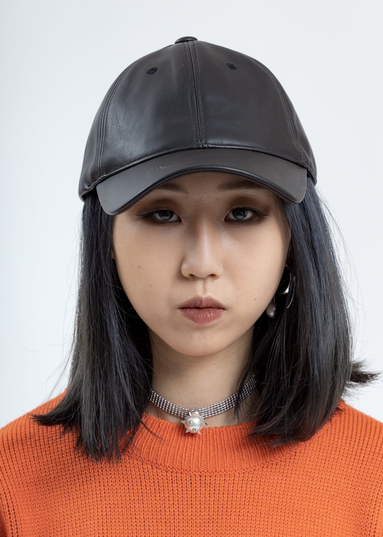 we11done Embossed Logo Fake Leather Cap - Black | Garmentory