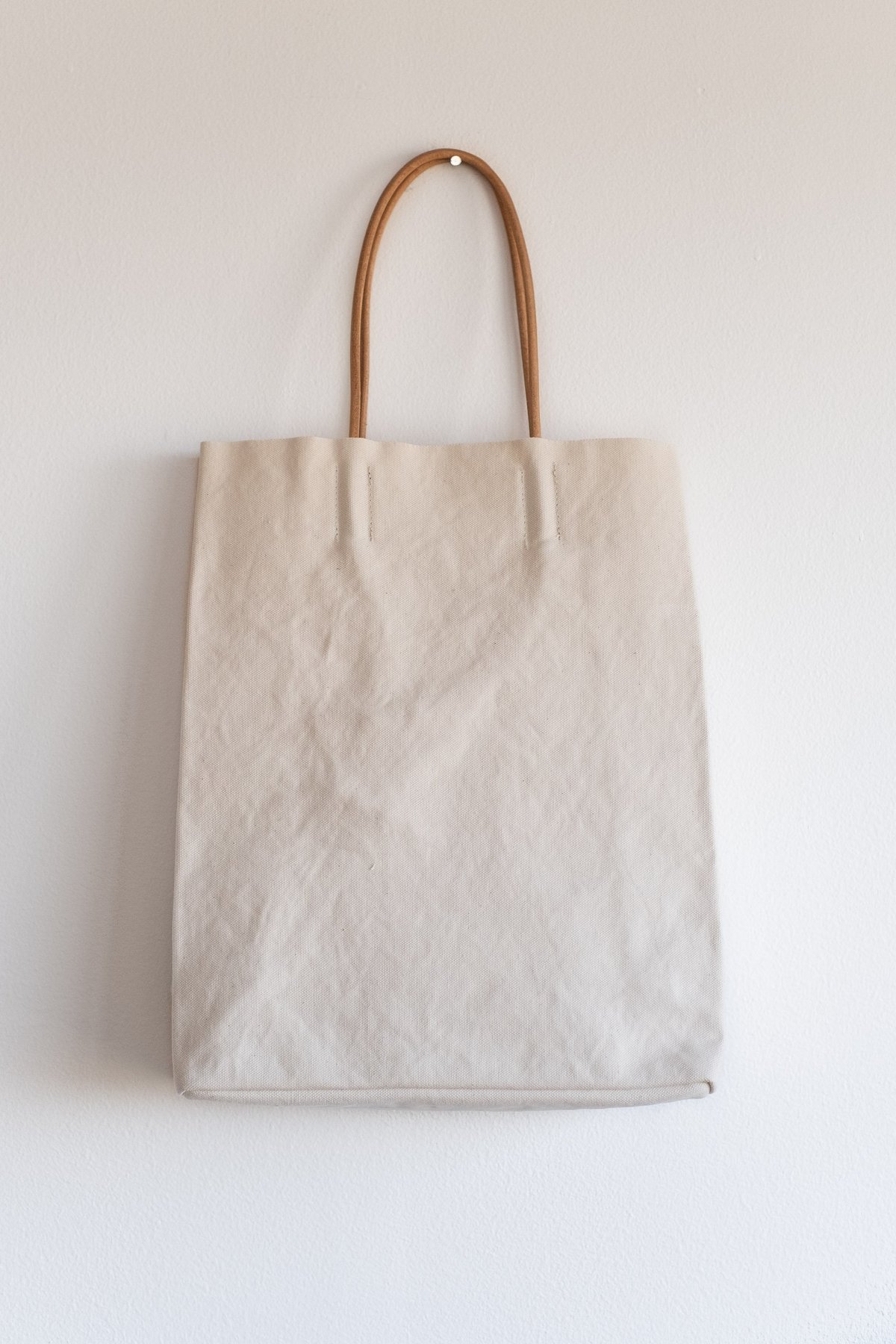 Amiacalva Tall Canvas Paper Bag - White | Garmentory