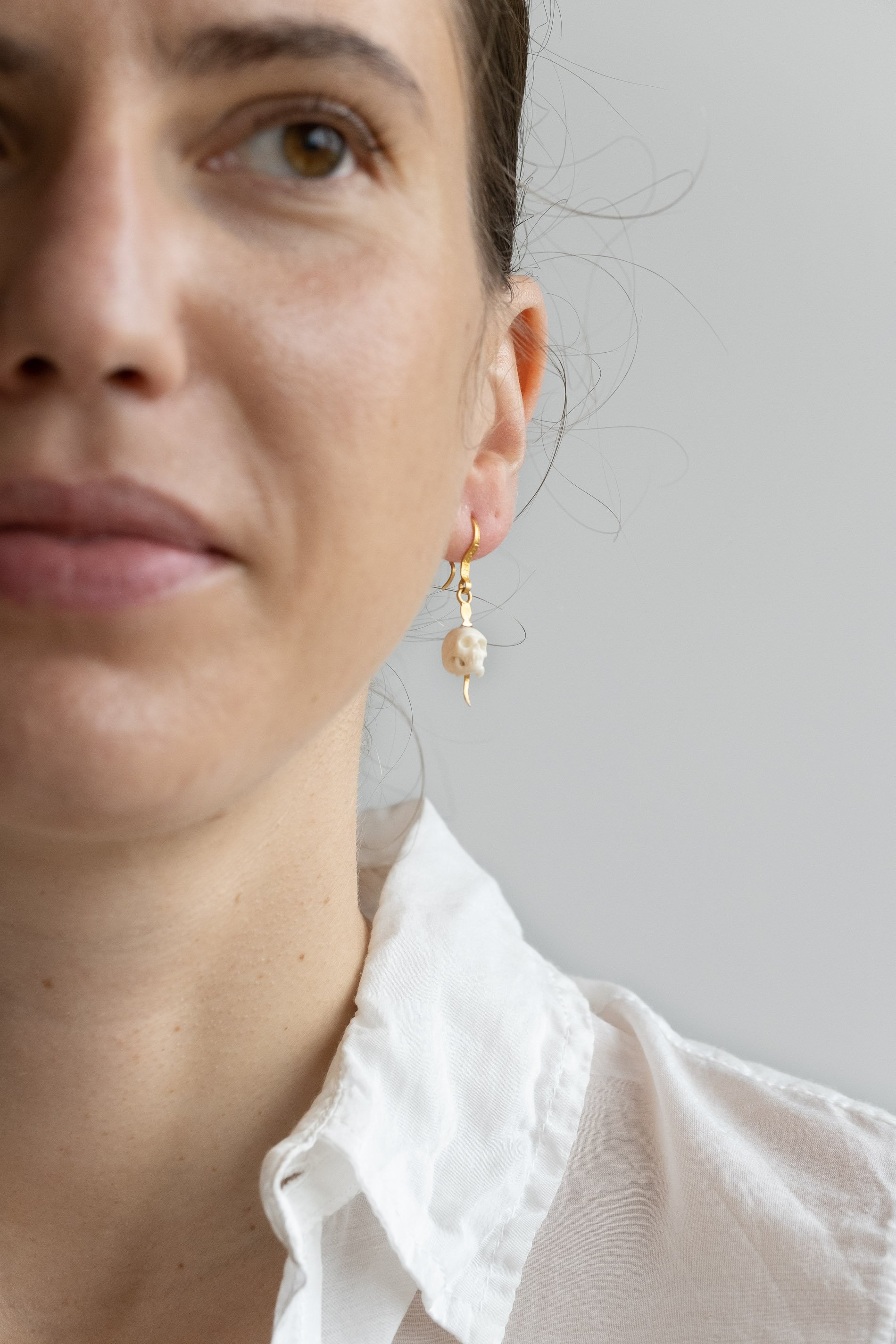 Lou Zeldis CARVED YAK BONE SKULL EARRINGS -22K Yellow Gold | Garmentory