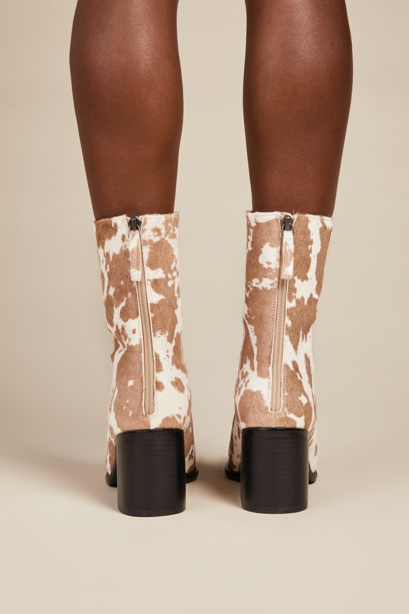 "INTENTIONALLY __________." PG Boots - Moo Taupe | Garmentory