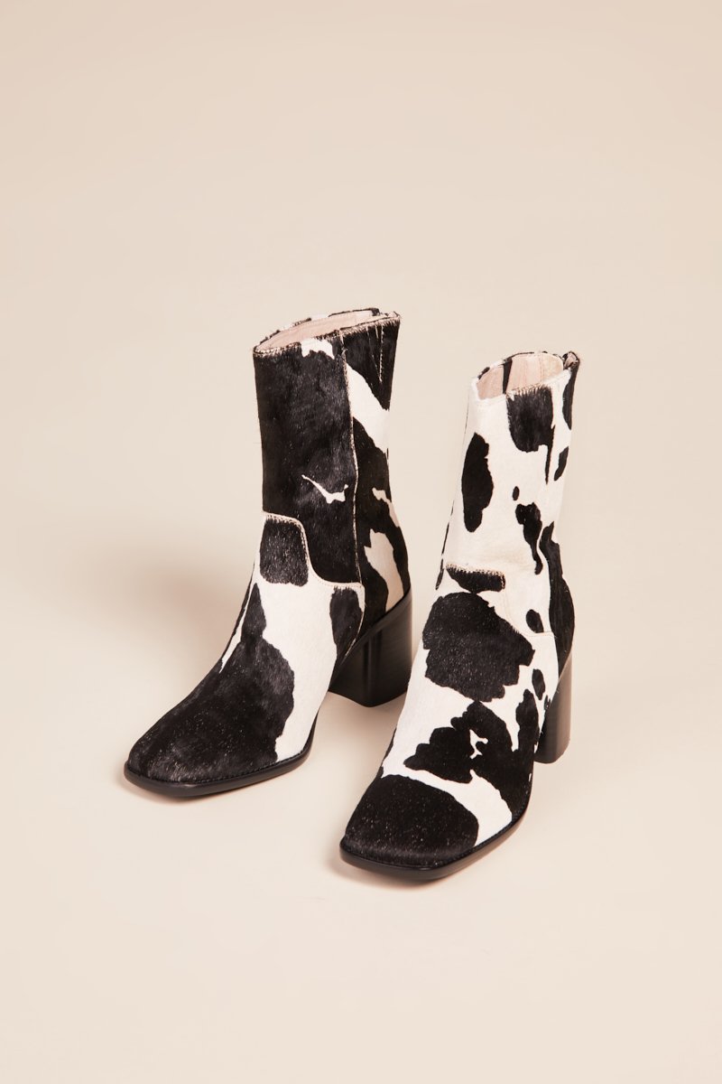 "INTENTIONALLY __________." PG boots - Moo | Garmentory