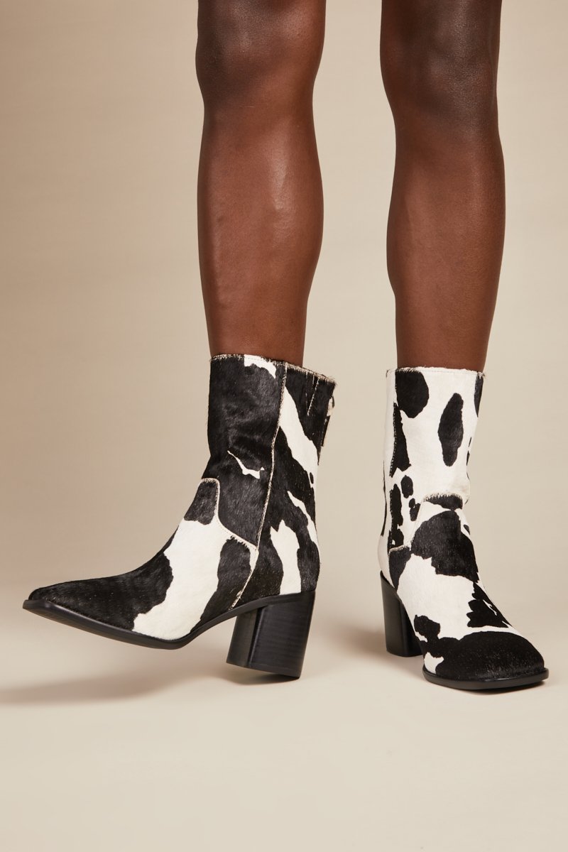 "INTENTIONALLY __________." PG boots - Moo | Garmentory