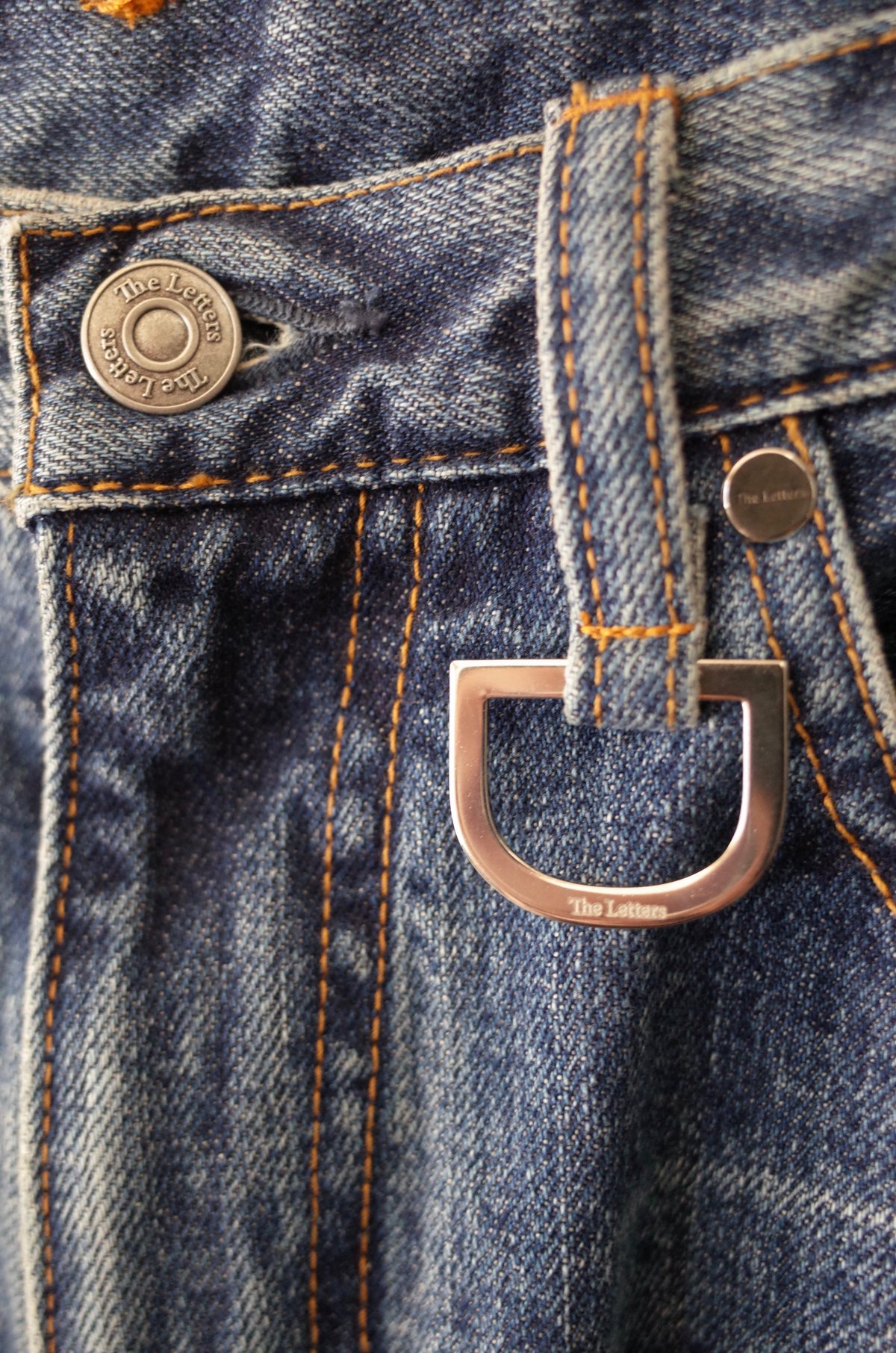 The Letters Indigo Washed 5 Pocket D Ring Boot Cut - Denim | Garmentory