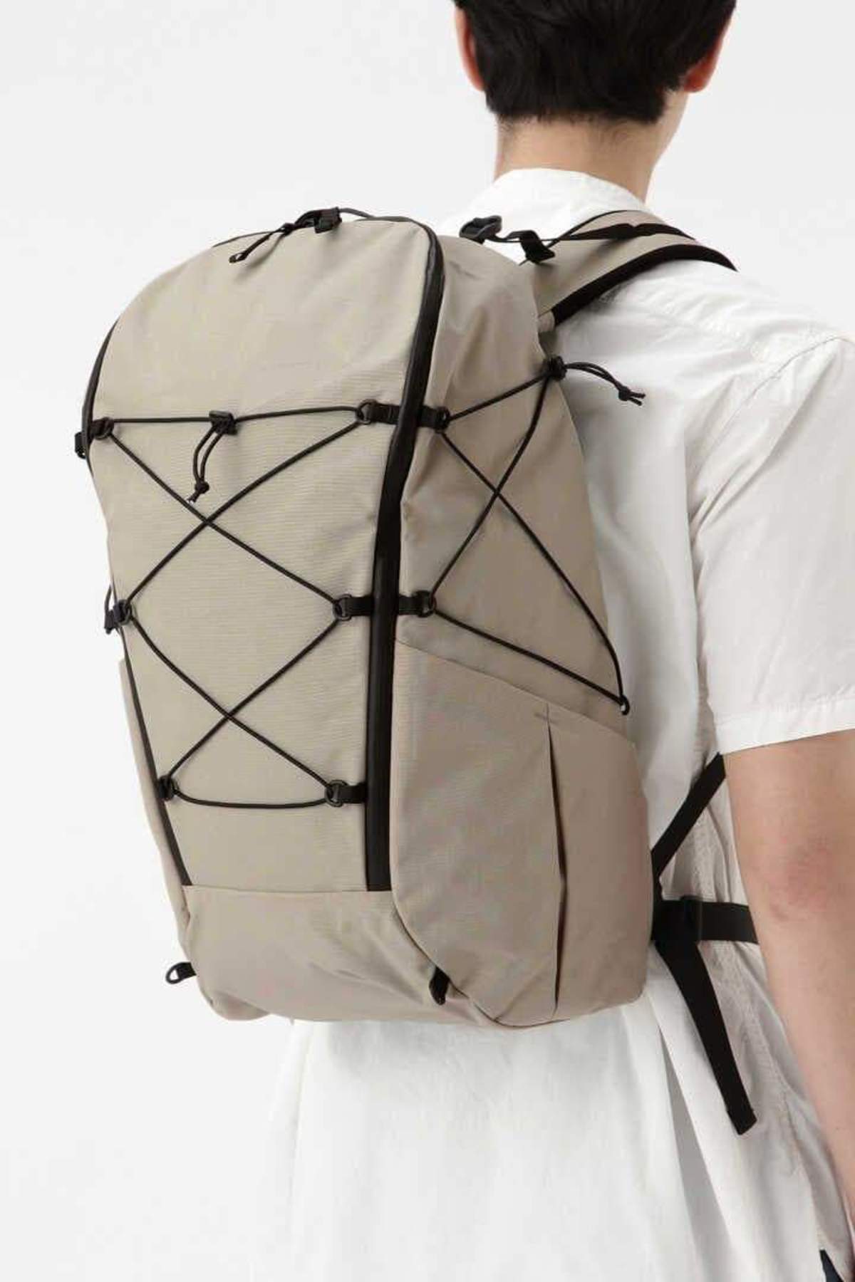 And Wander heather backpack - Beige | Garmentory