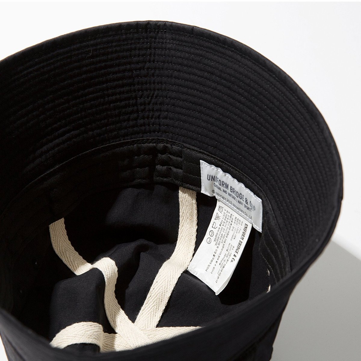 UNIFORM BRIDGE Sailor Bucket Hat - Black | Garmentory