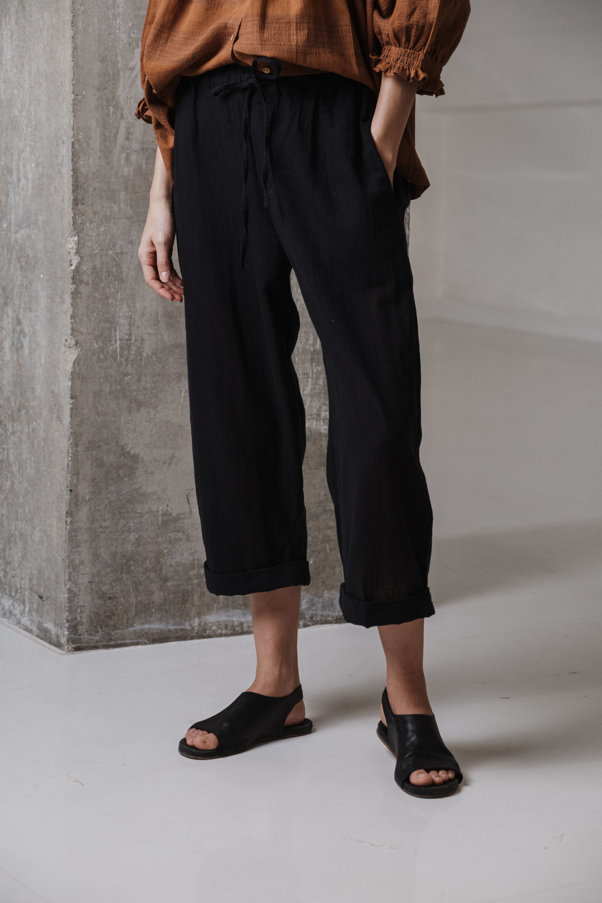 World of Crow organic roll-up hem pants - BLACK | Garmentory