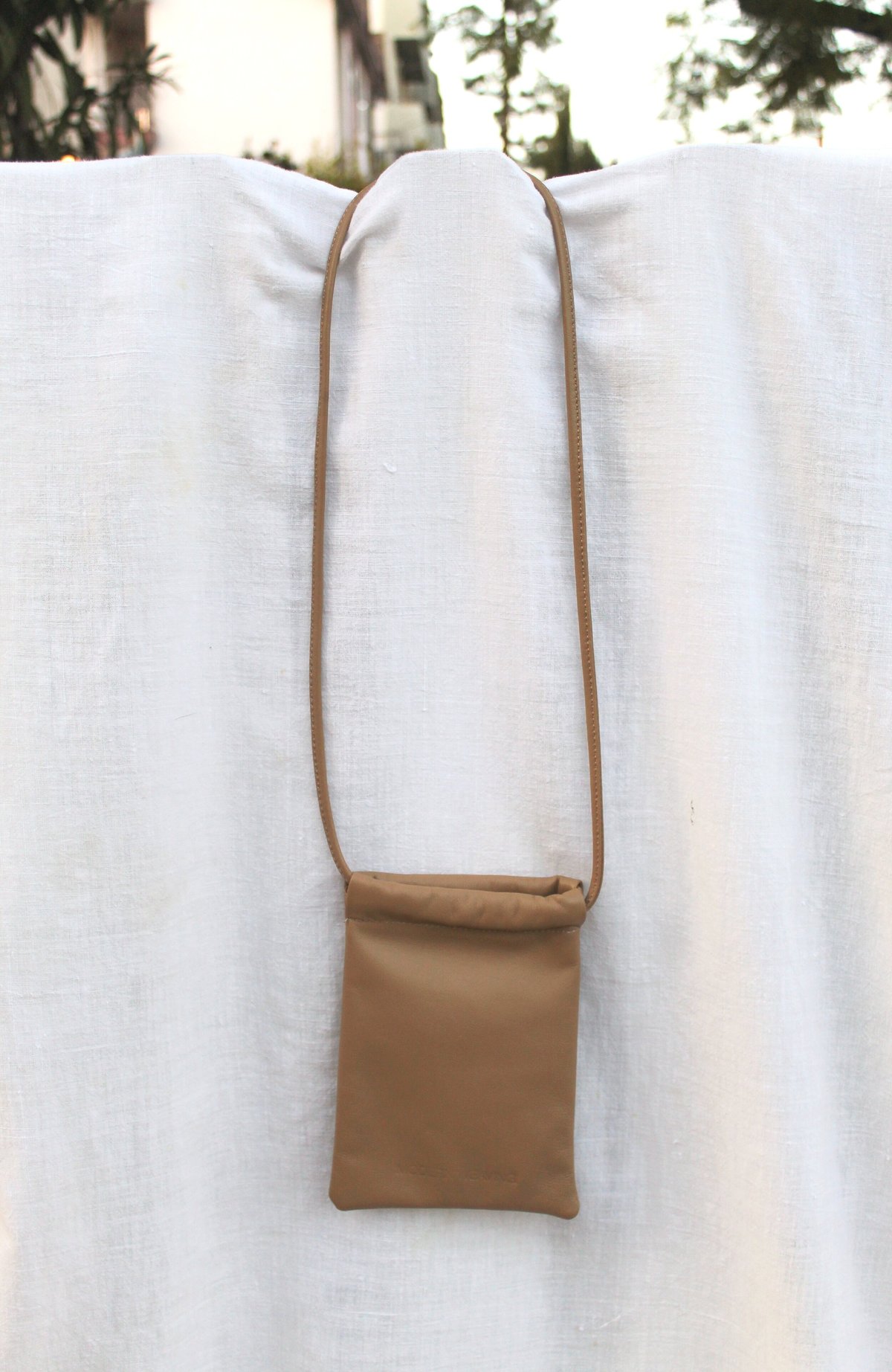Modern Weaving Drawstring Sling Bag - Camel | Garmentory