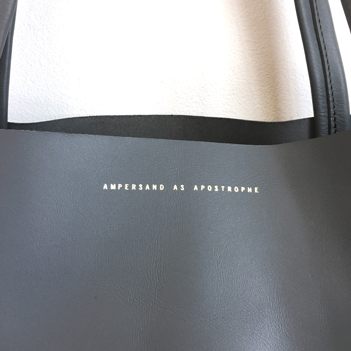 Ampersand as Apostrophe Sideways Tote Stiff in Steel Grey | Garmentory