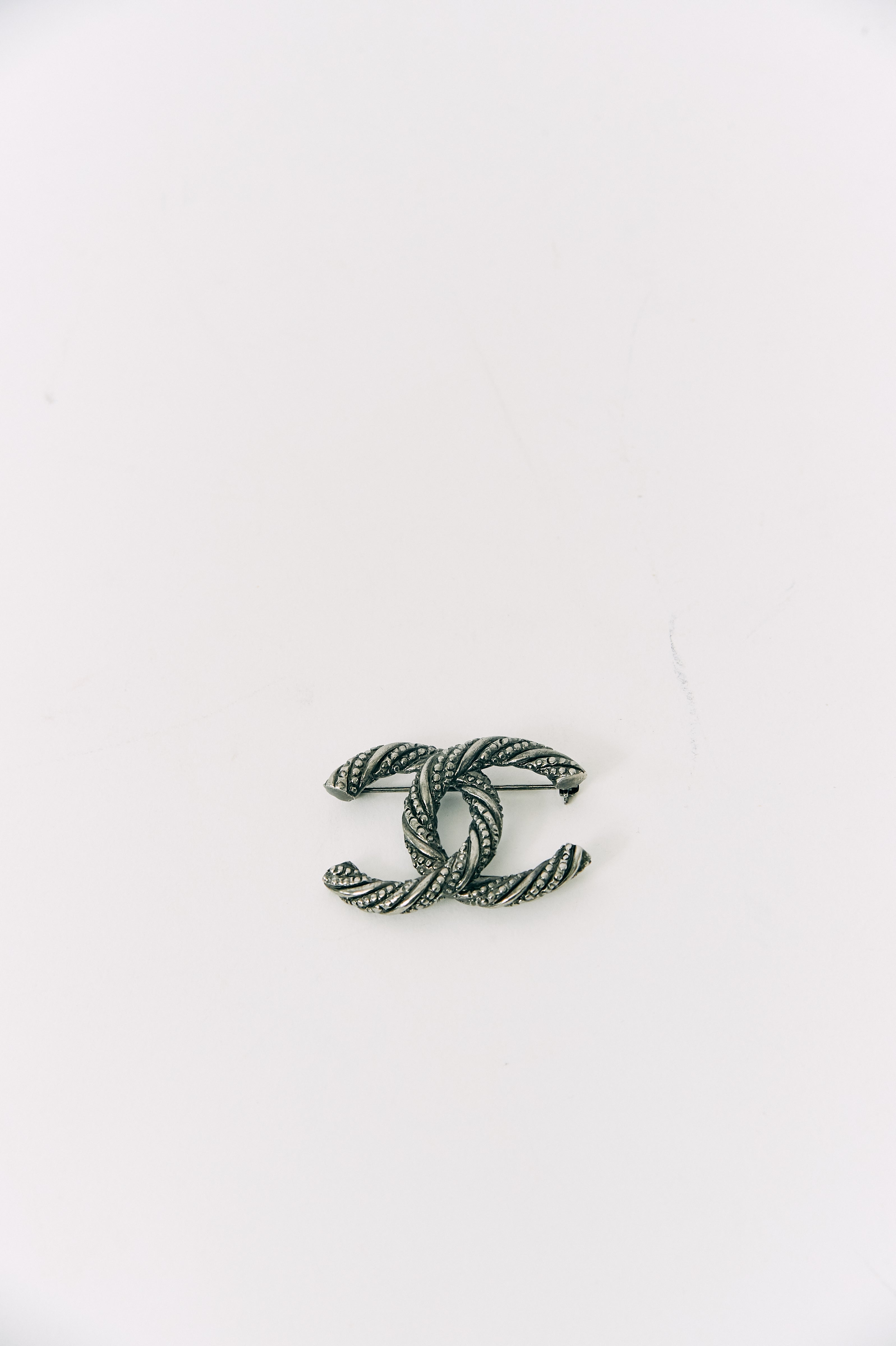Chanel Interlocking Logo Broach - Silver | Garmentory