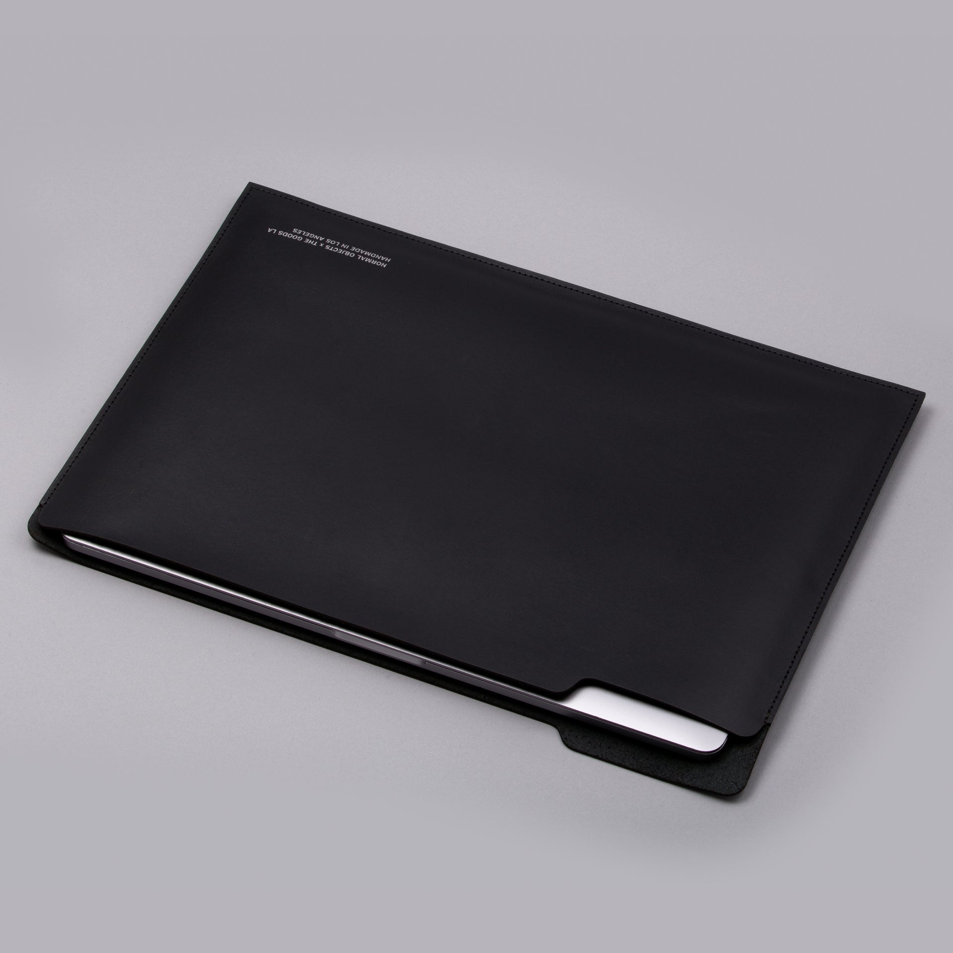 NORMAL OBJECTS NO-008 LAPTOP FOLIO - BLACK | Garmentory