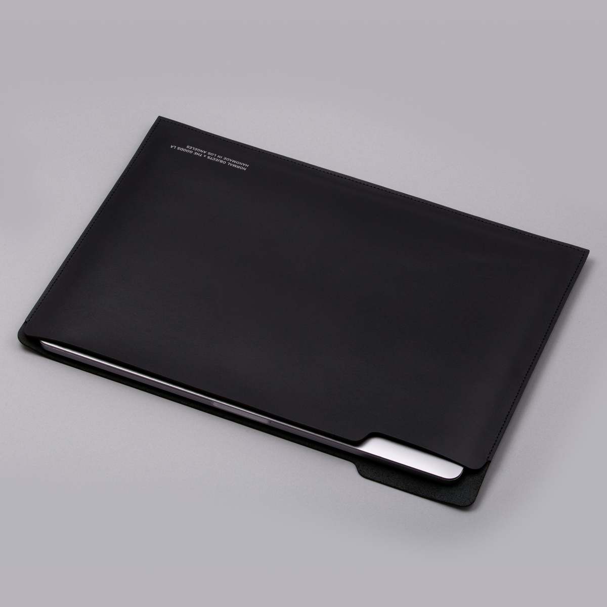 NORMAL OBJECTS NO-008 LAPTOP FOLIO - BLACK | Garmentory