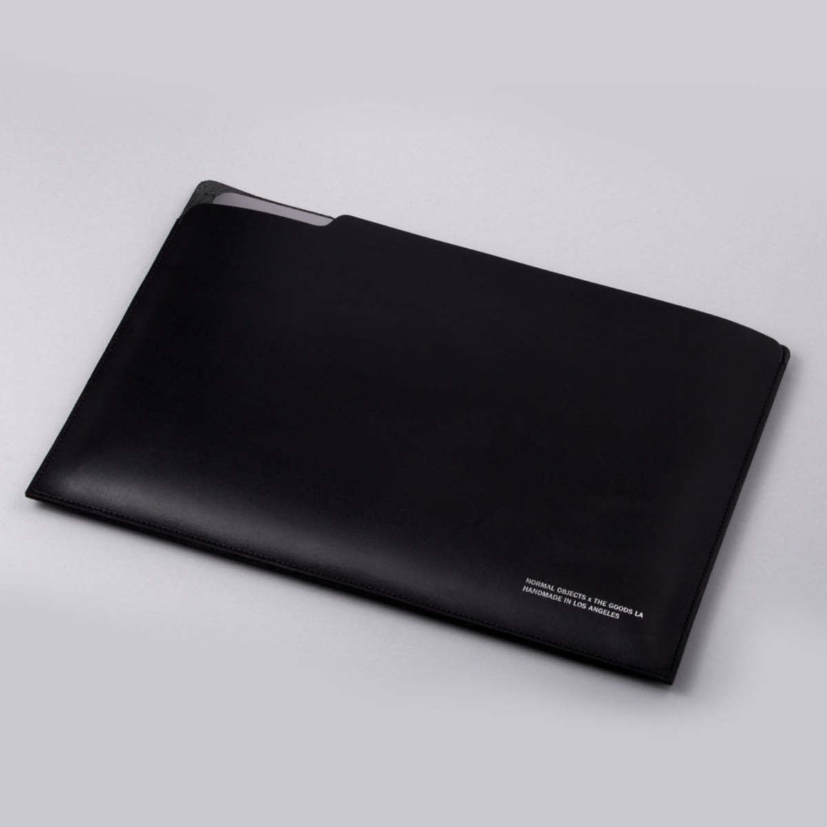 NORMAL OBJECTS NO-008 LAPTOP FOLIO - BLACK | Garmentory