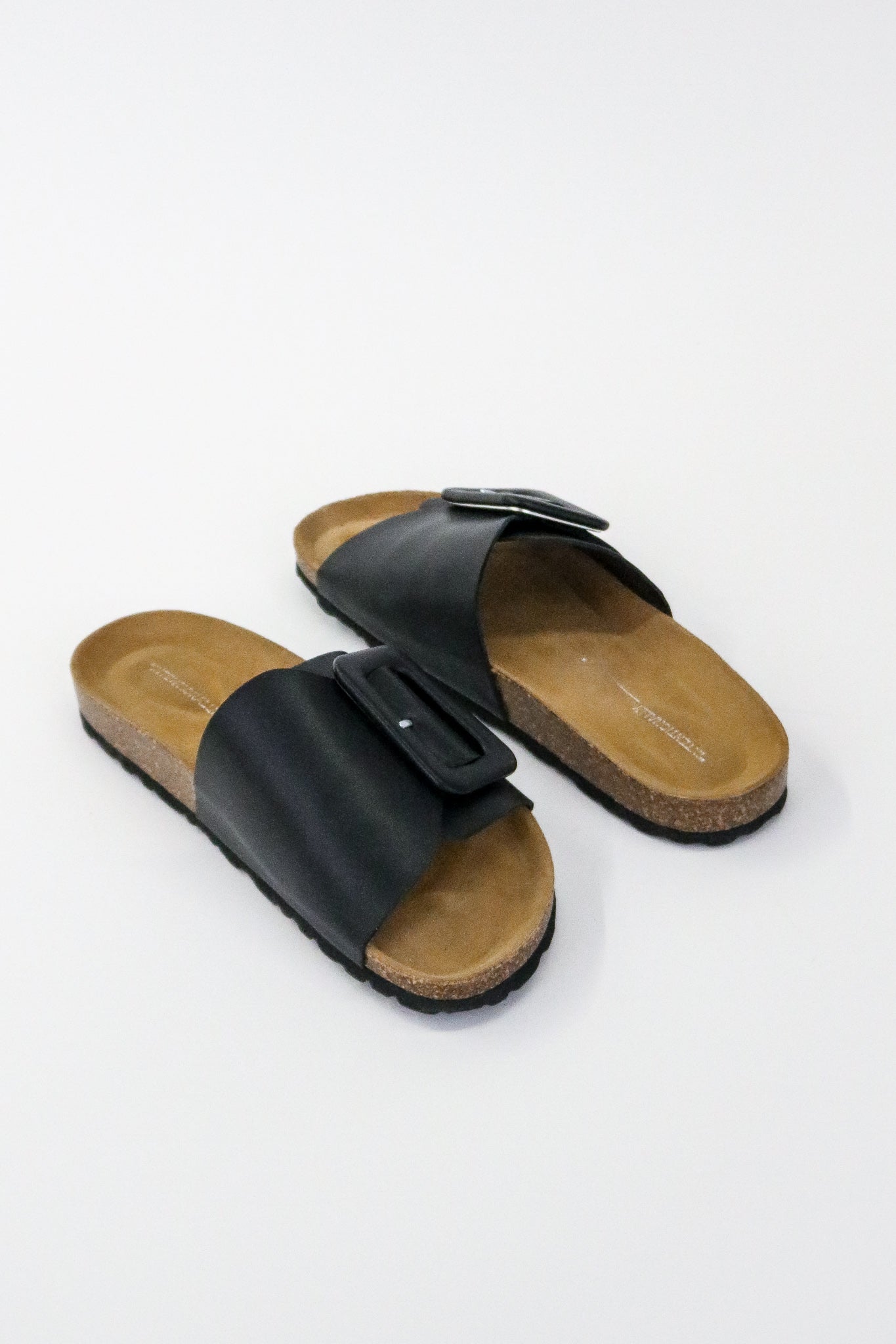 "INTENTIONALLY __________." Clarice Sandal - Black | Garmentory