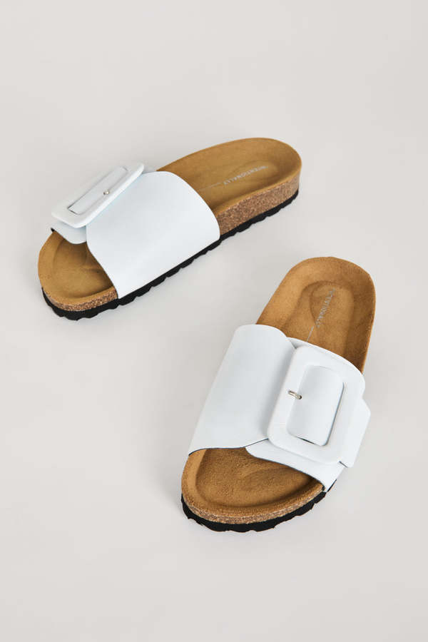 "INTENTIONALLY __________." Clarice Sandal - White | Garmentory