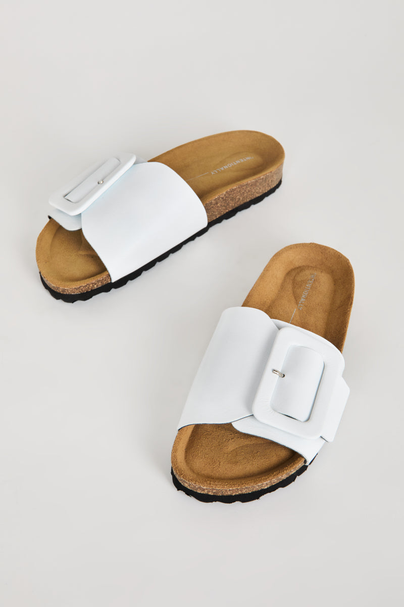 "INTENTIONALLY __________." Clarice Sandal - White | Garmentory
