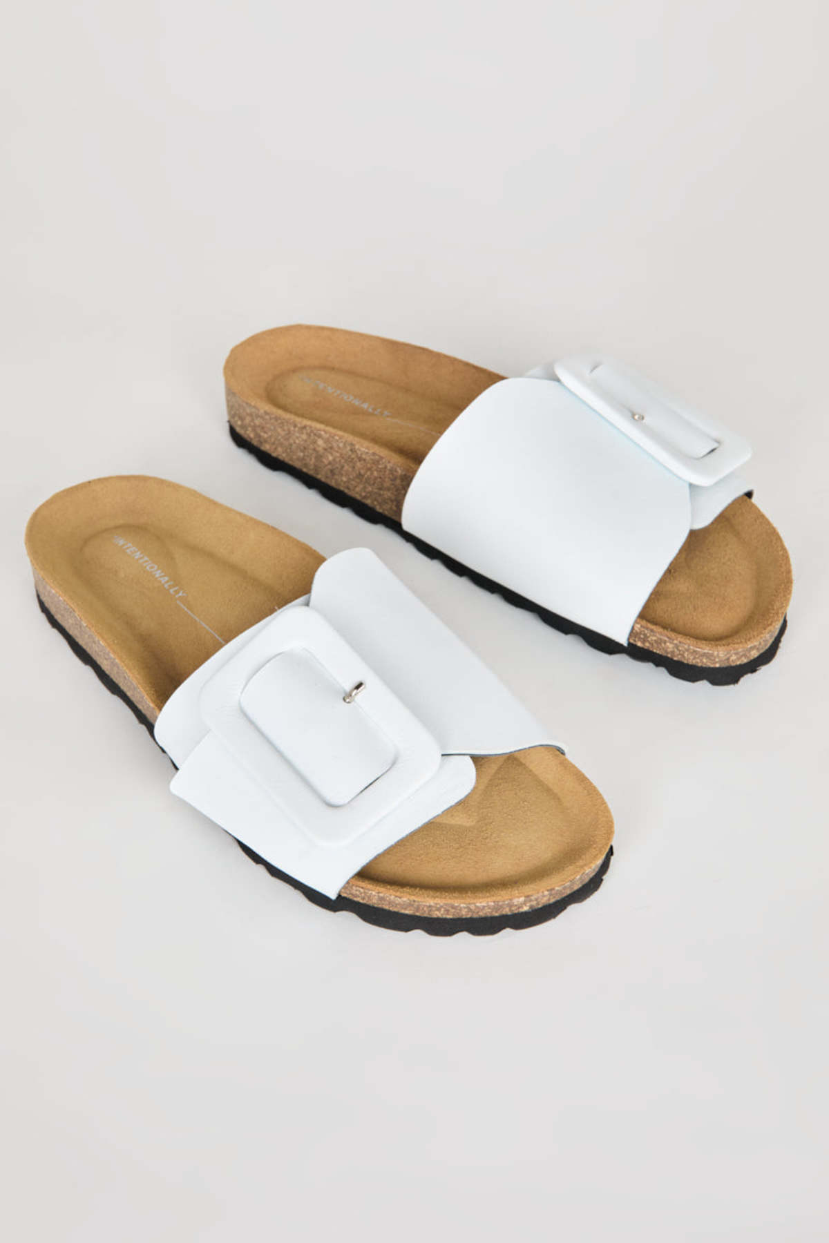 "INTENTIONALLY __________." Clarice Sandal - White | Garmentory