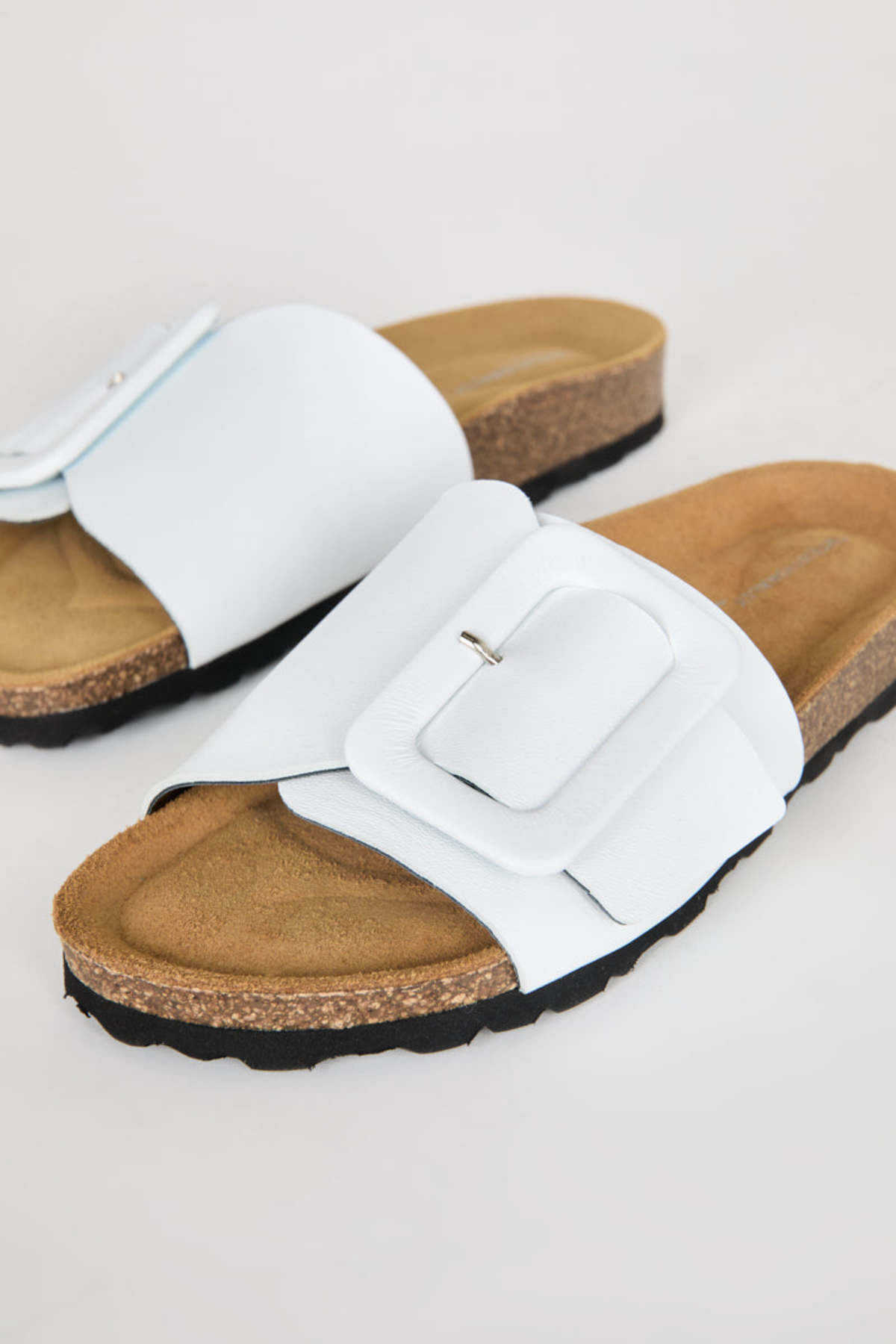 "INTENTIONALLY __________." Clarice Sandal - White | Garmentory