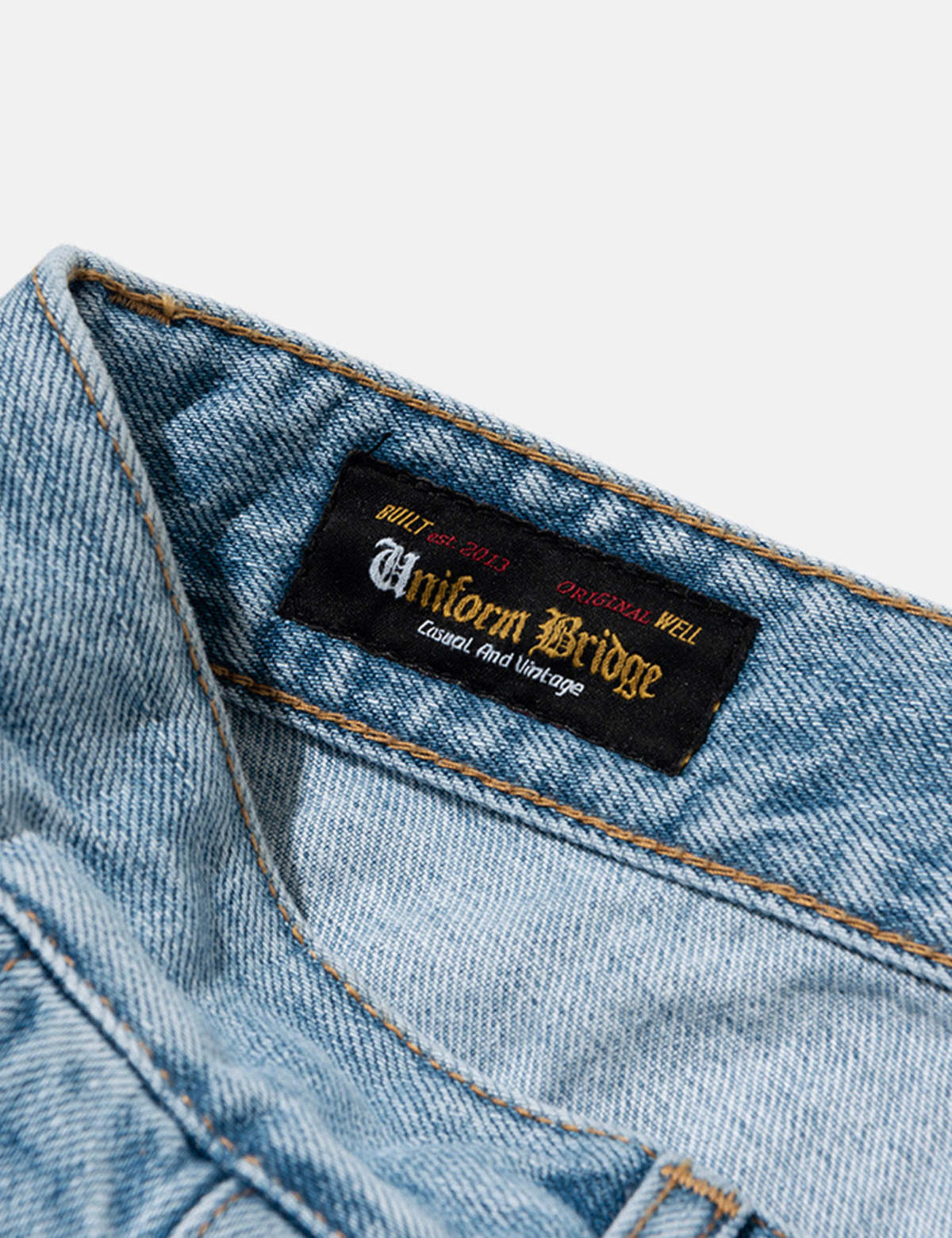 Uniform Bridge Two Tuck Denim Pant - BLUE | Garmentory