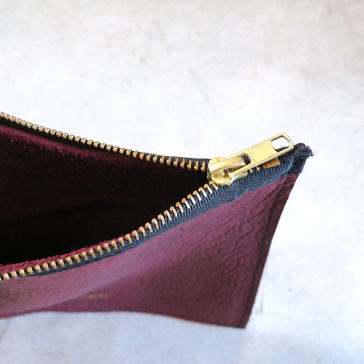 Ampersand as Apostrophe Sideways Tote in Oxblood Buffalo | Garmentory