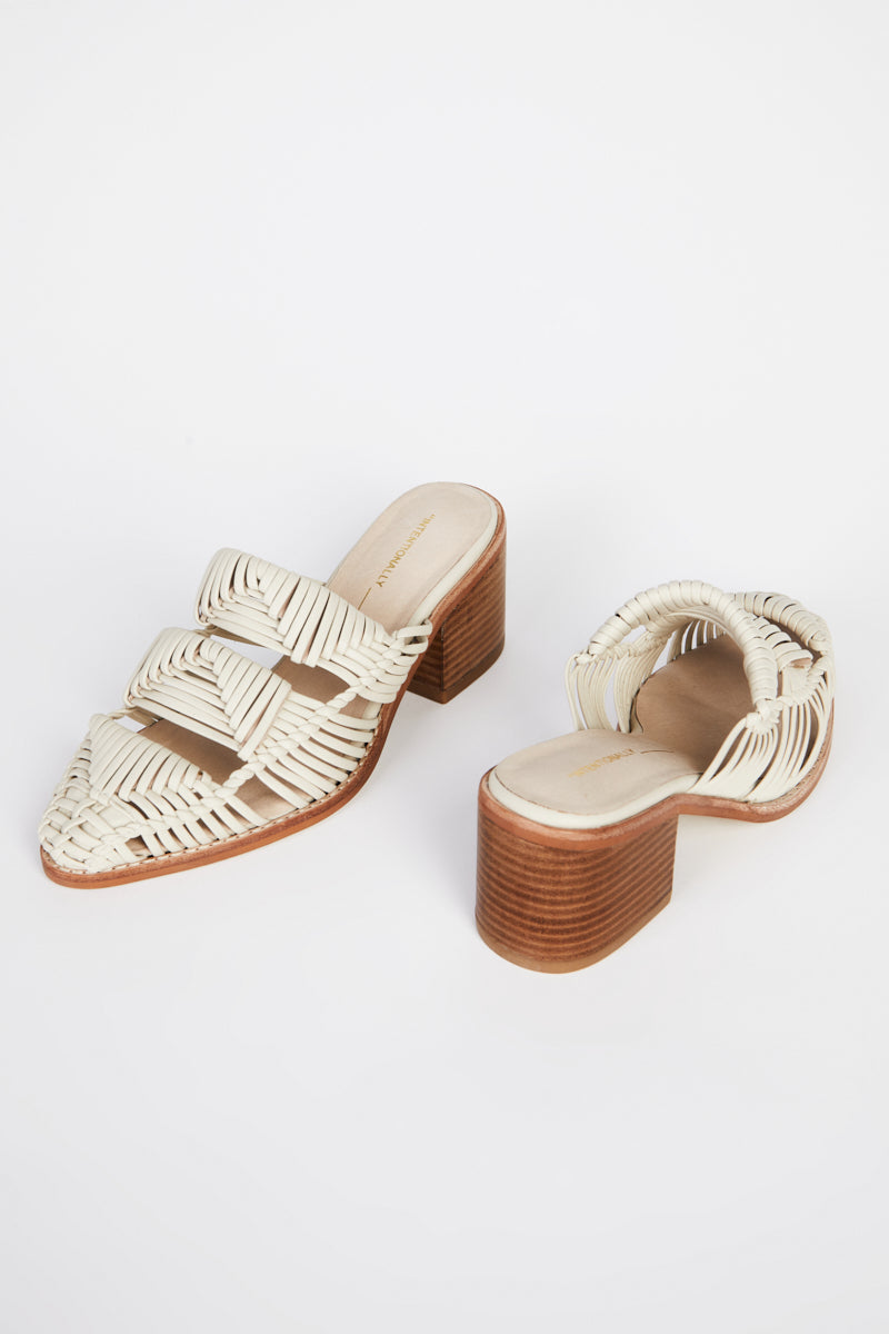"INTENTIONALLY __________." Calista Mule - Cream | Garmentory