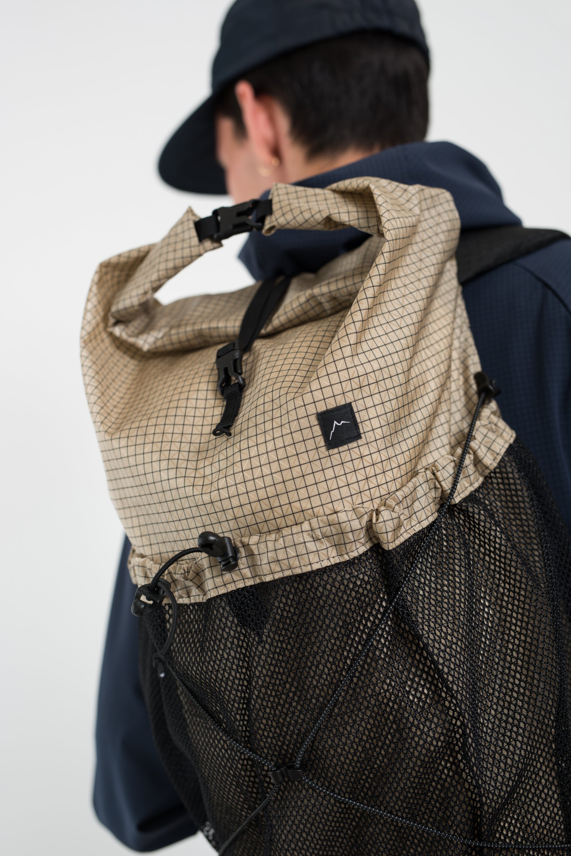 CAYL Gaya Roll Top Backpack - B-Grid Mesh Beige | Garmentory