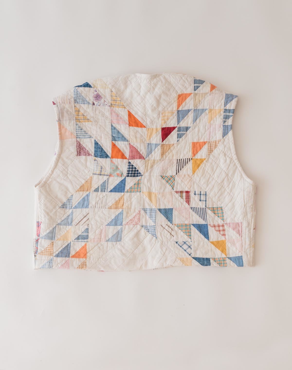 Noble x Encourage Vintage Adult Quilted Vest in Triangles | Garmentory
