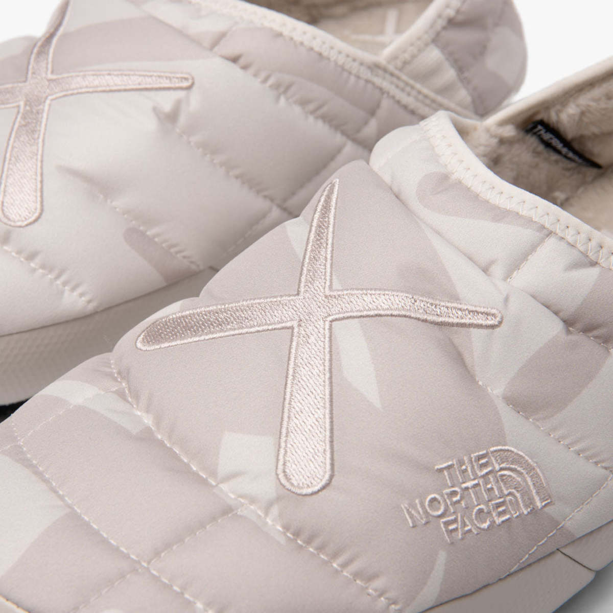 THE NORTH FACE x KAWS Thermoball Traction Mule - Moonlight Ivory/Nuptse ...