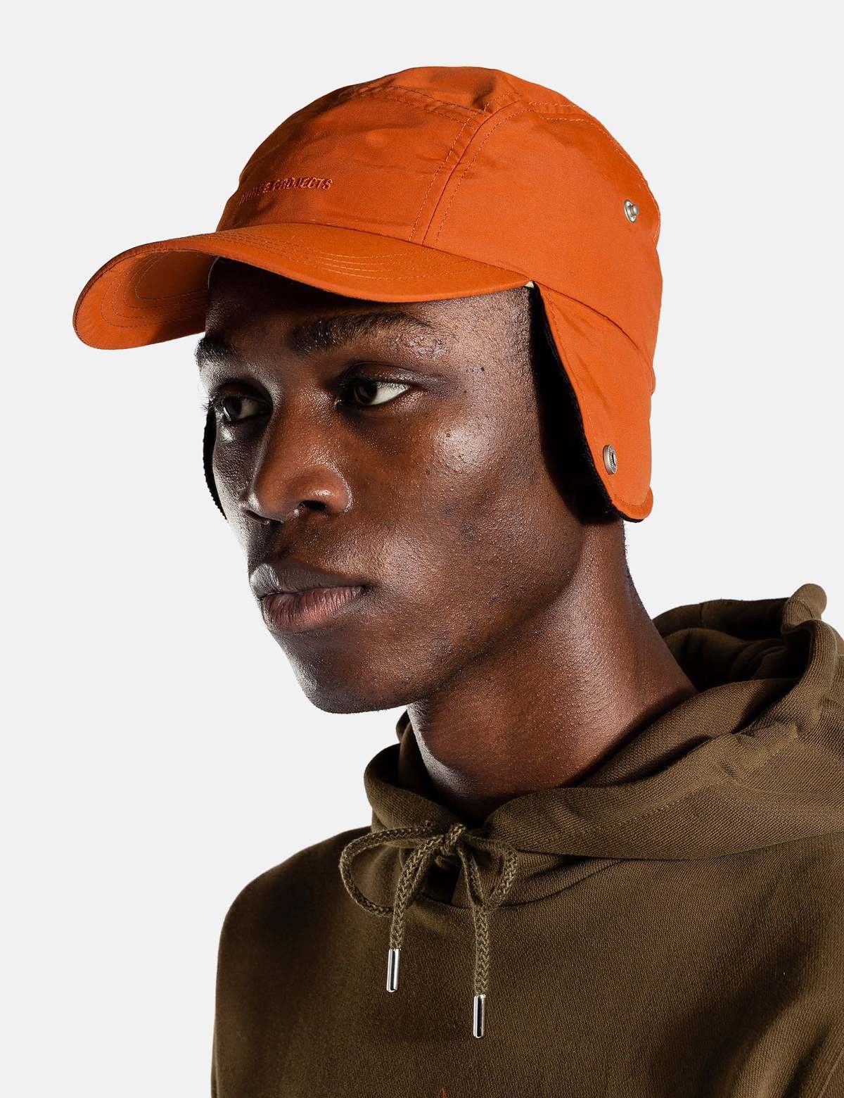Norse Projects Nylon Flap Cap - Burnt Orange | Garmentory