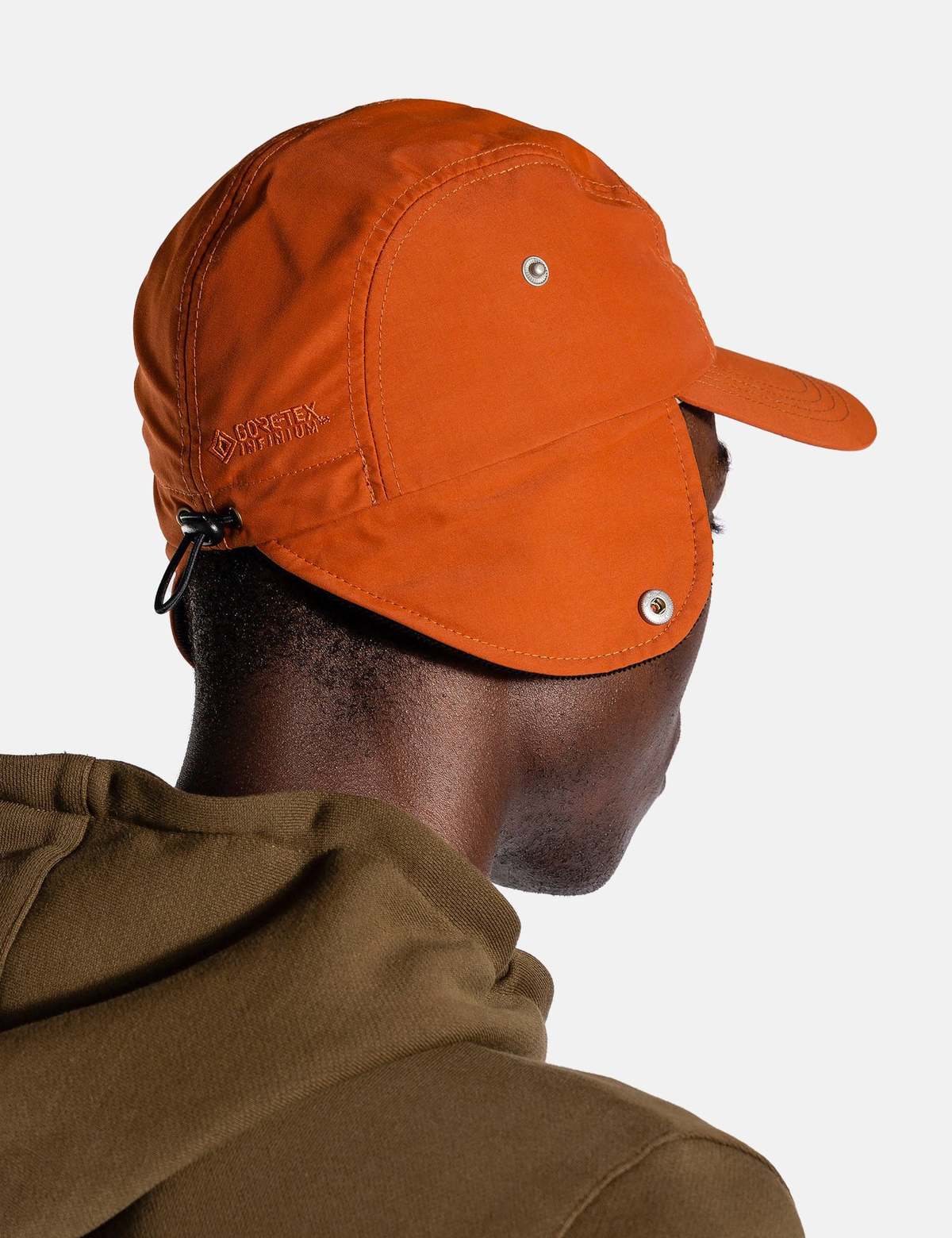 Norse Projects Nylon Flap Cap - Burnt Orange | Garmentory