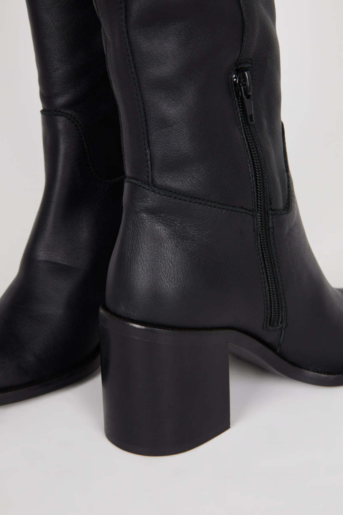 "INTENTIONALLY __________." Port Tall Barn Boot - Black | Garmentory