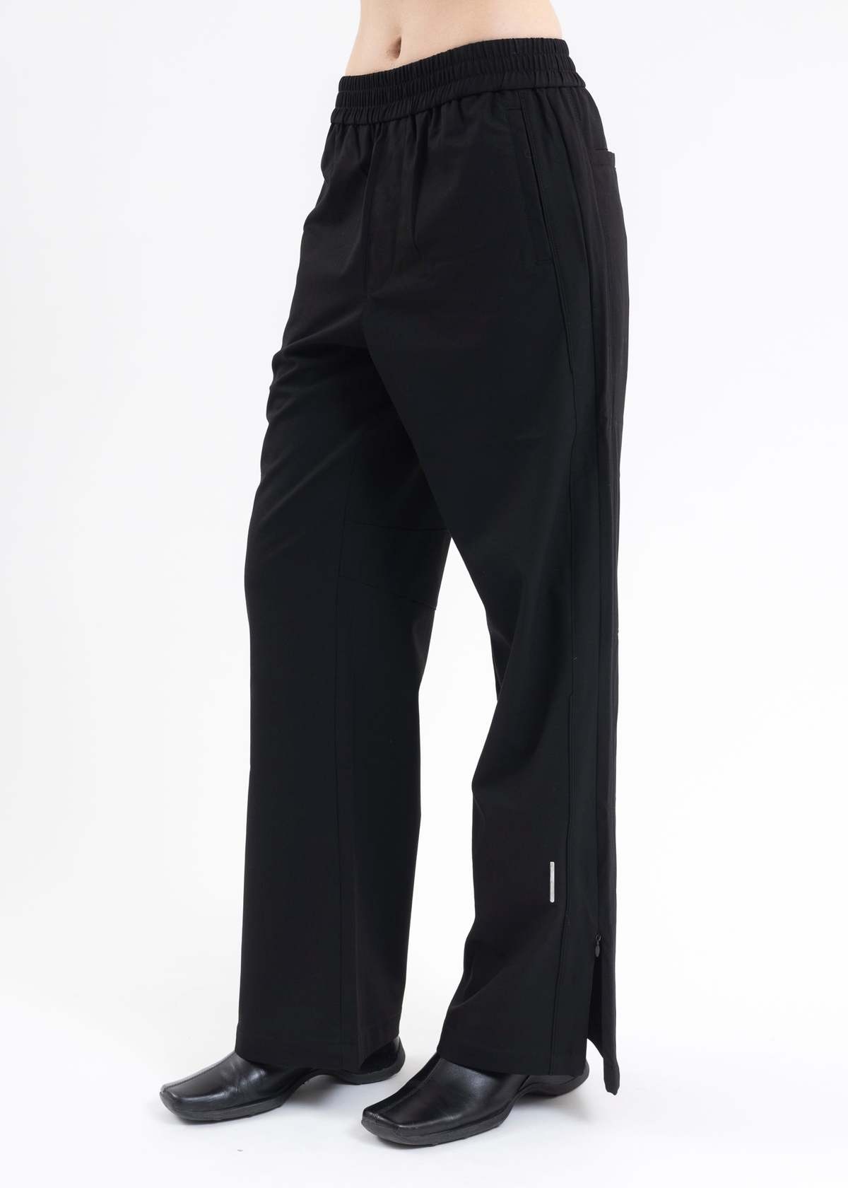C2H4 SOLEMN STREAMLINE PANELLED TAILORED TRACK PANTS - BLACK | Garmentory