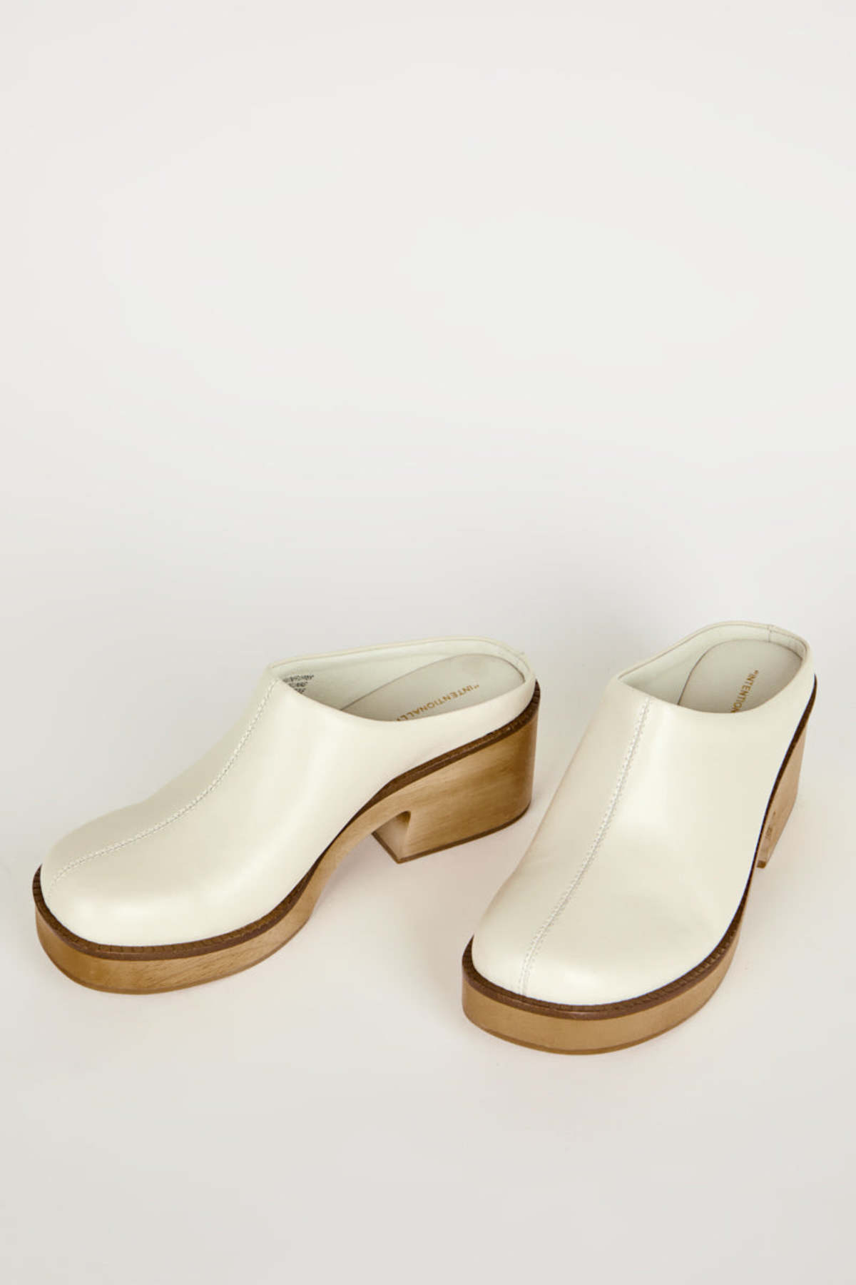 "INTENTIONALLY __________." Tides Clog Mule - Cream | Garmentory