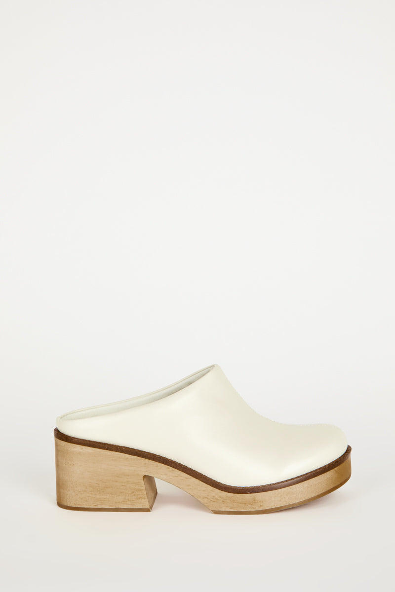 "INTENTIONALLY __________." Tides Clog Mule - Cream | Garmentory