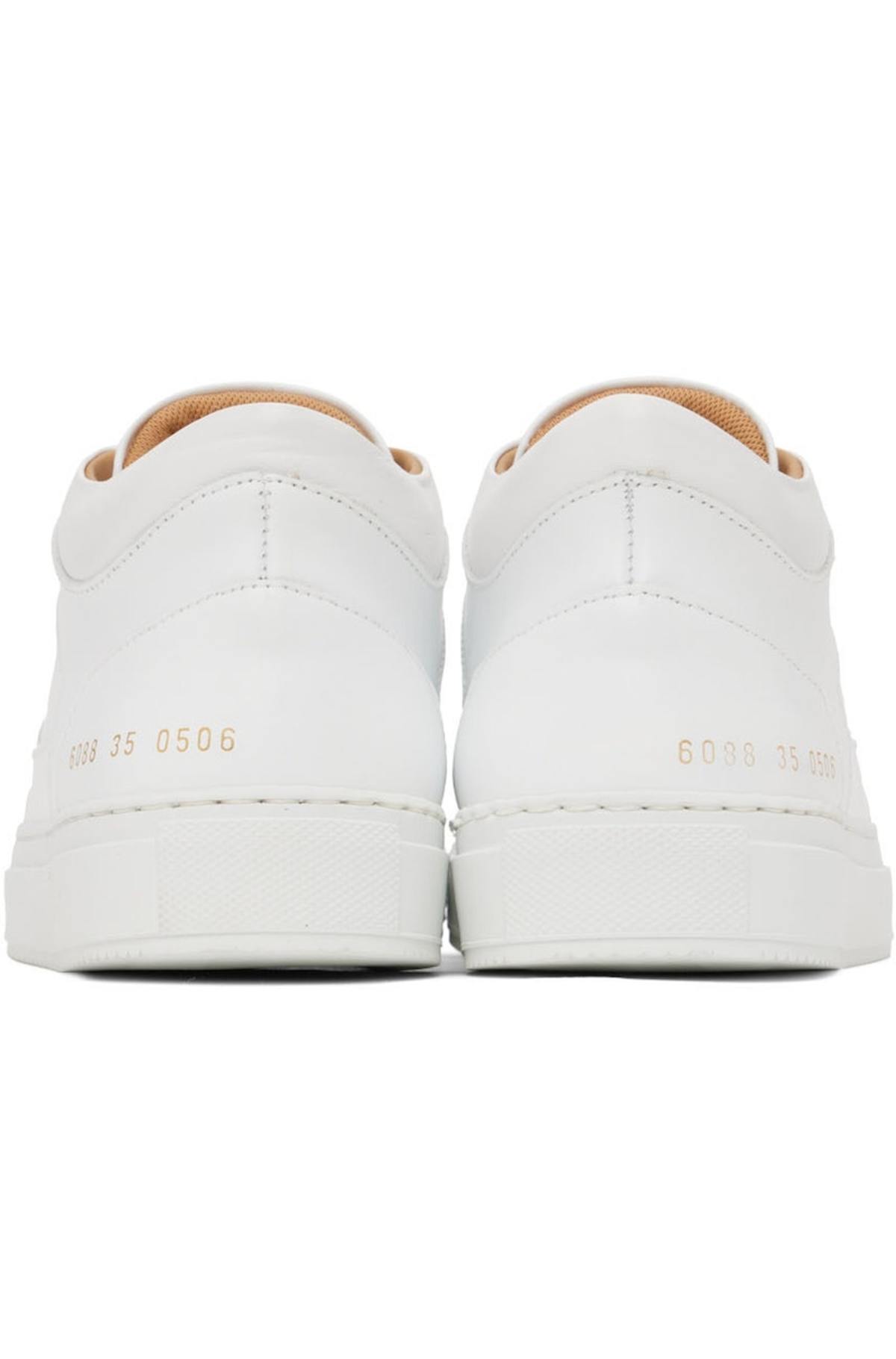 Common Projects Decades Mid Sneakers - 0506 White | Garmentory