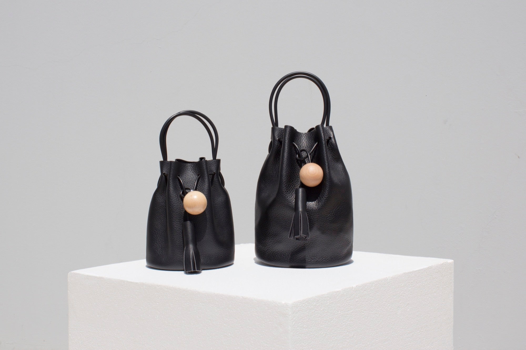 Building Block Mini Bucket Bag - Pebbled Black | Garmentory