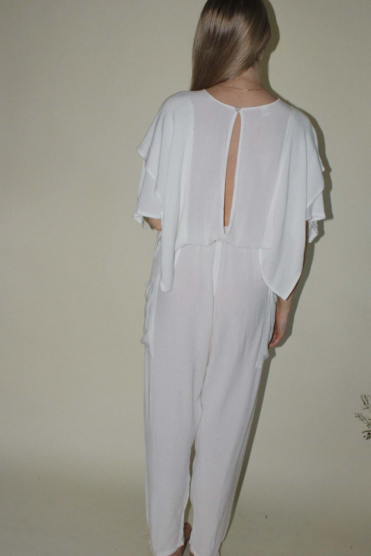 Flutter Sleeve Gauze Jumpsuit - White | Garmentory