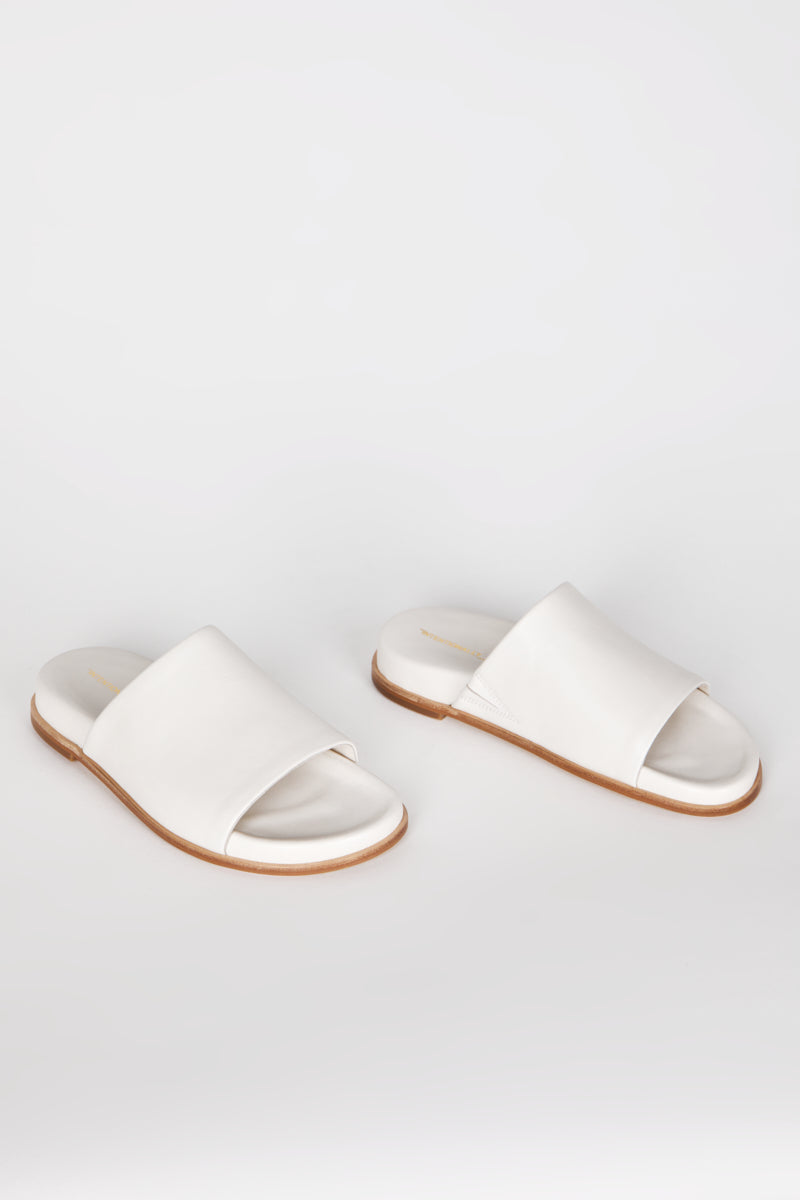"INTENTIONALLY __________." Pippy Slip On Sandal - Black | Garmentory
