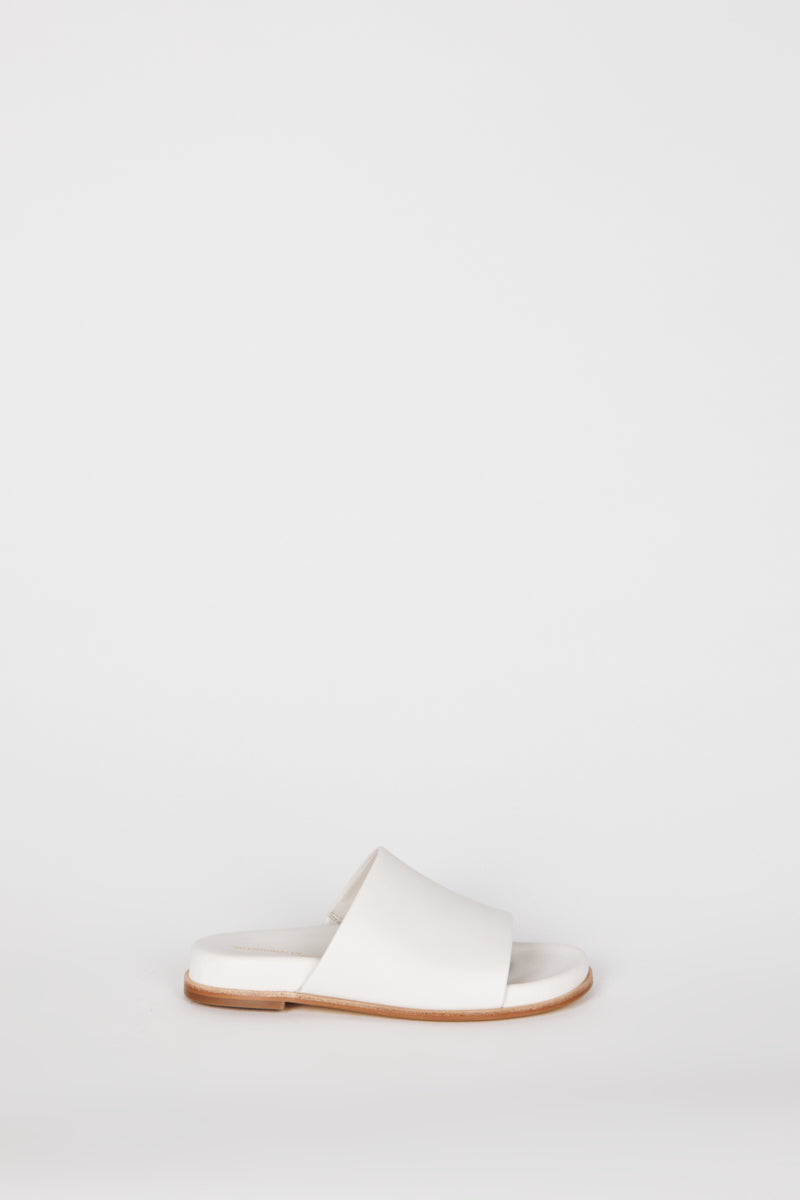 "INTENTIONALLY __________." Pippy Slip On Sandal - Black | Garmentory