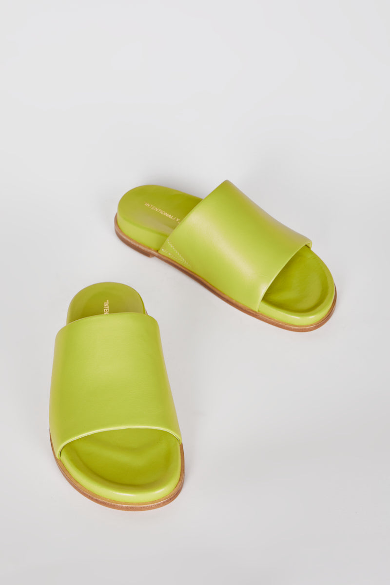 "INTENTIONALLY __________." Pippy Slip On Sandal - Black | Garmentory