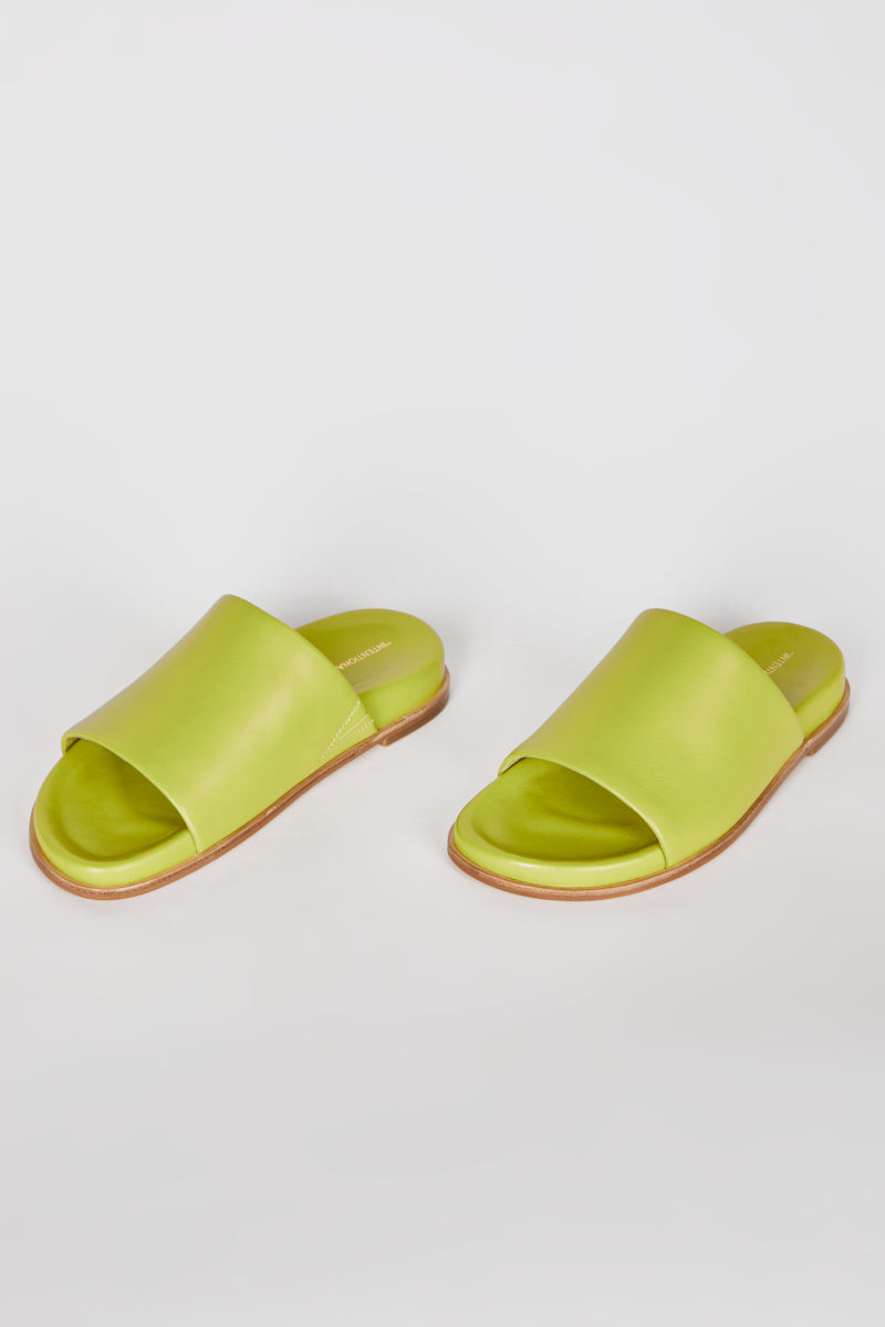 "INTENTIONALLY __________." Pippy Slip On Sandal - Black | Garmentory