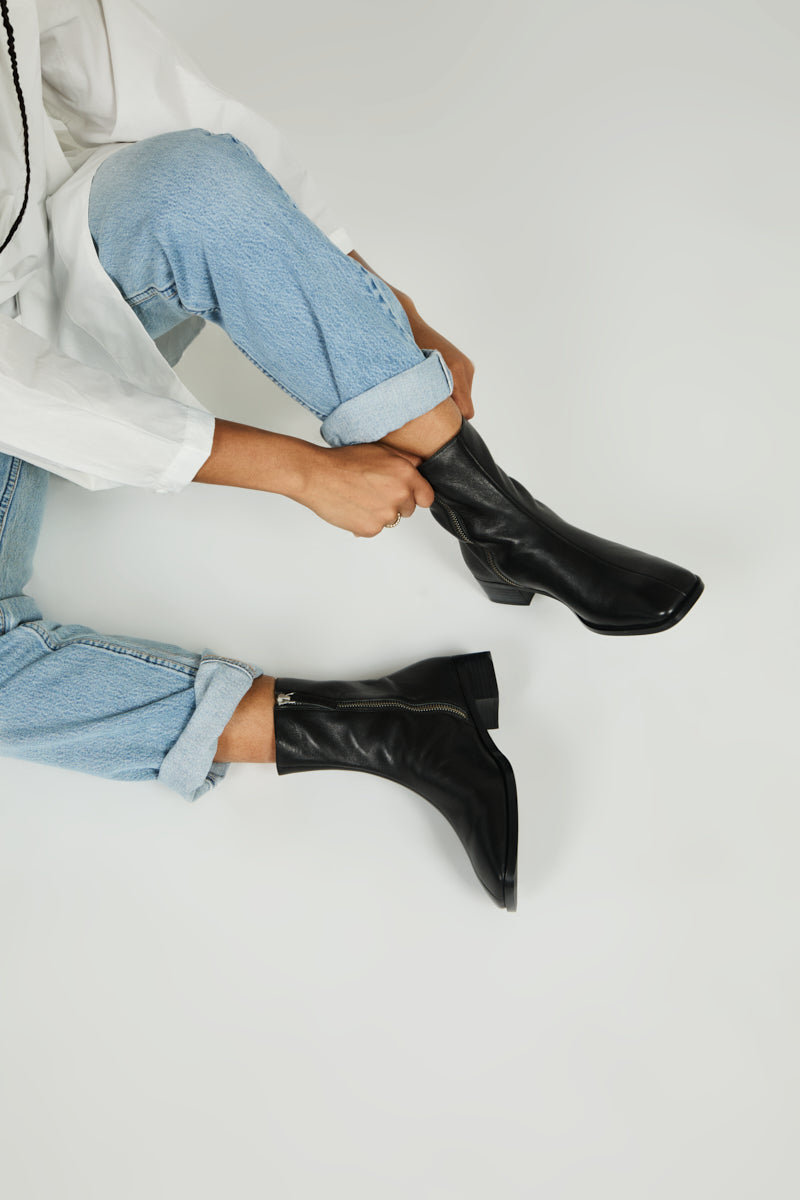 "INTENTIONALLY __________." TOUR LEATHER BOOT - Black/Brown | Garmentory