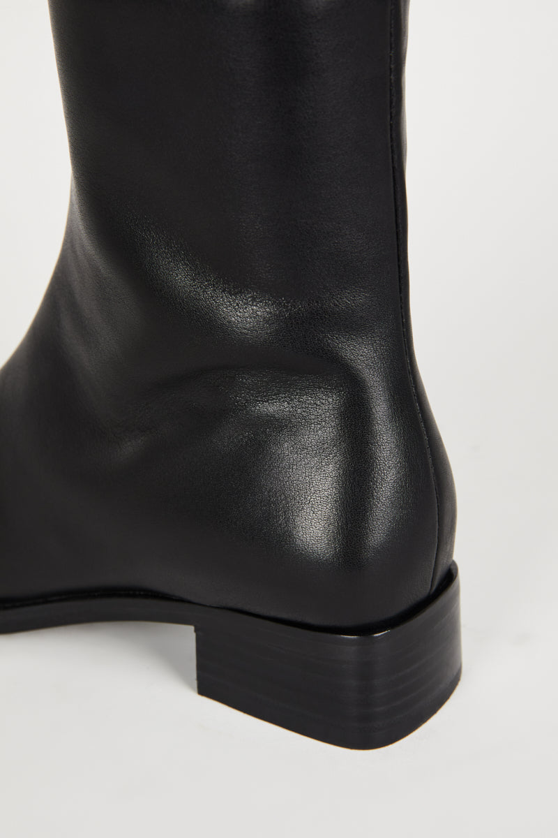 "INTENTIONALLY __________." TOUR LEATHER BOOT - Black/Brown | Garmentory